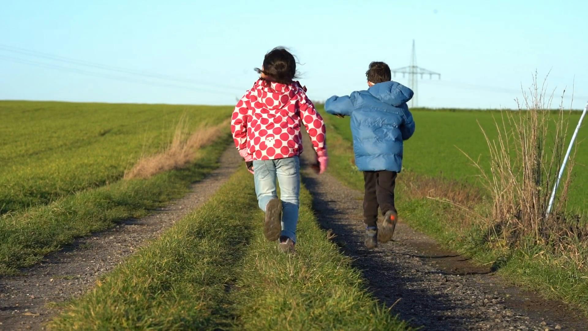 Children Running on an Off-Road Trail · Free Stock Video