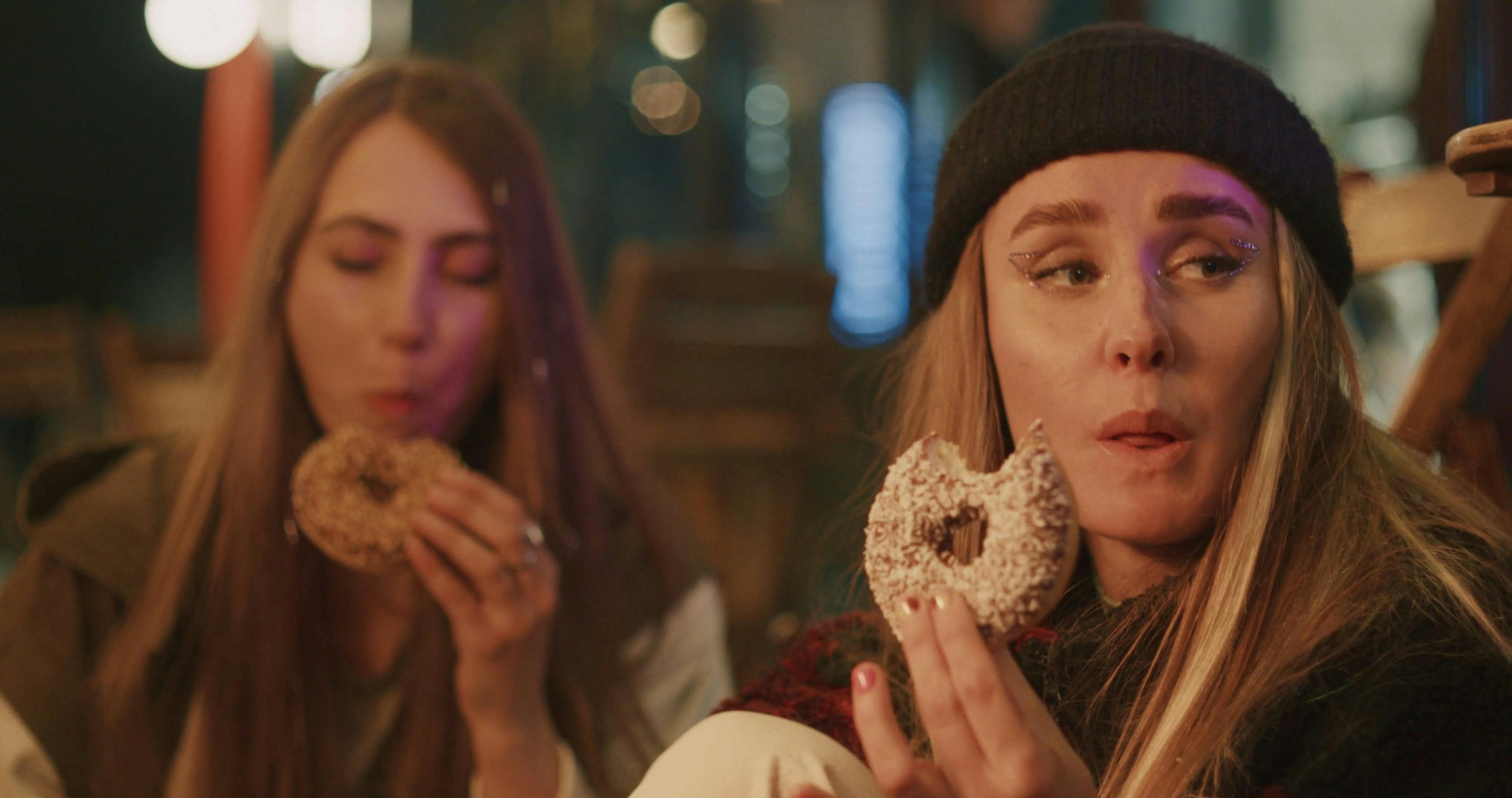 Women Eating Doughnuts while Talking Free Stock Video Footage, Royalty ...