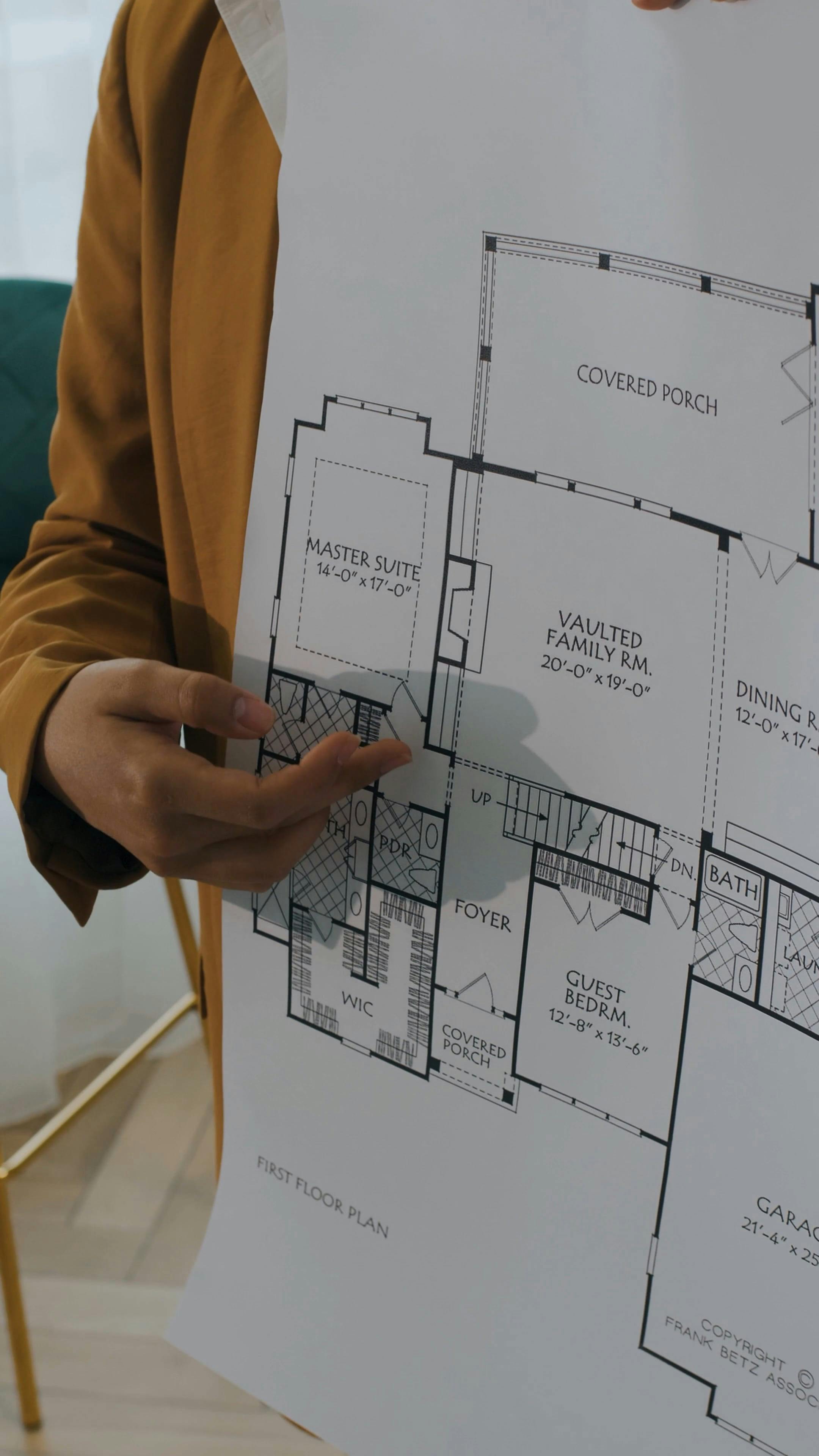 An Architect Writing on the Document Floor Plan Free Stock Video ...