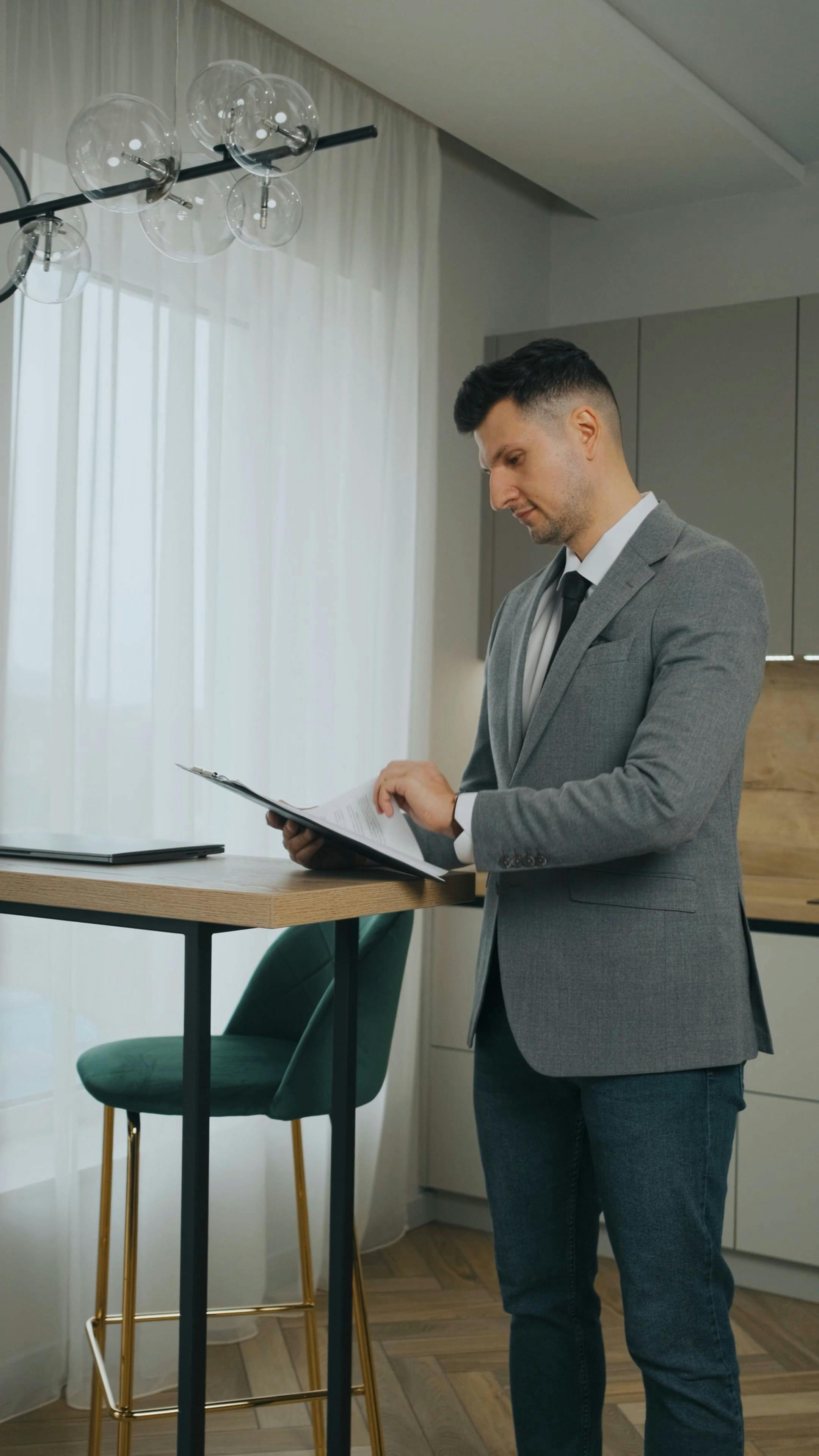 Man in Formal Wear Looking Through Papers Free Stock Video Footage ...