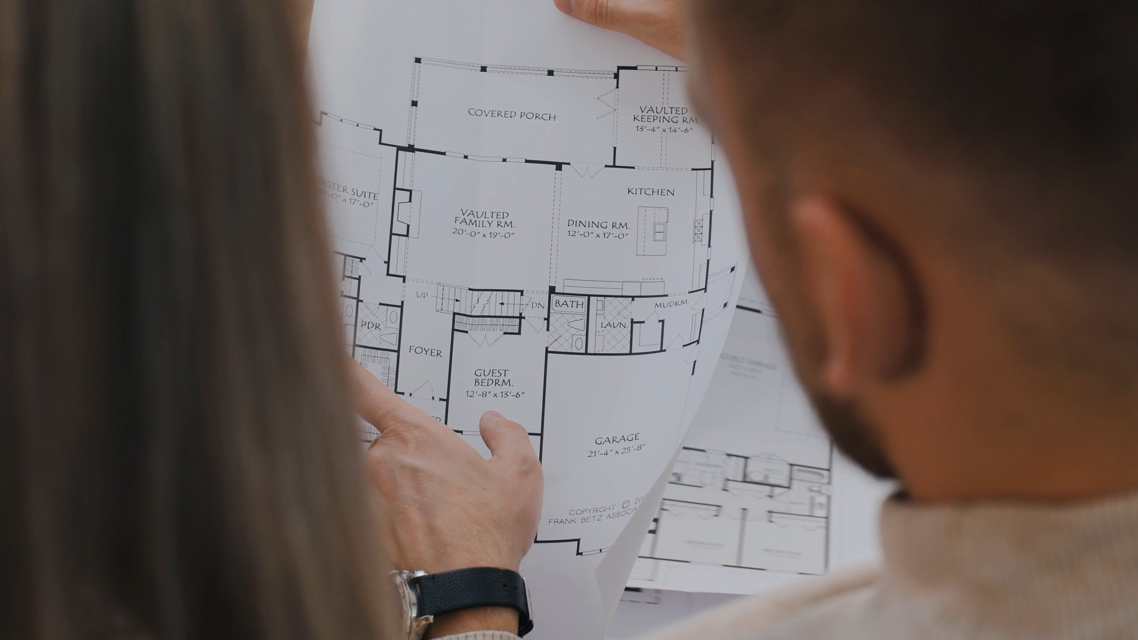 People Looking at a Floor Plan · Free Stock Video