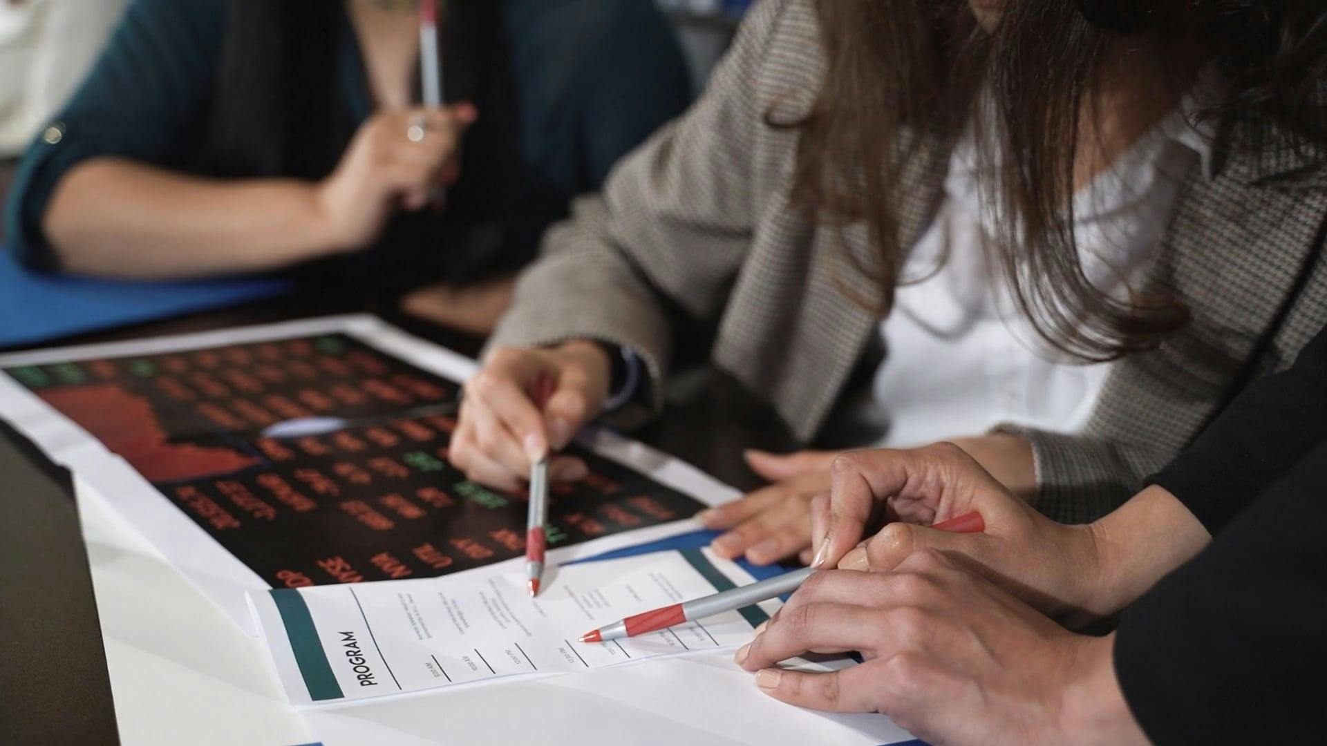 Women Discussing the Program · Free Stock Video