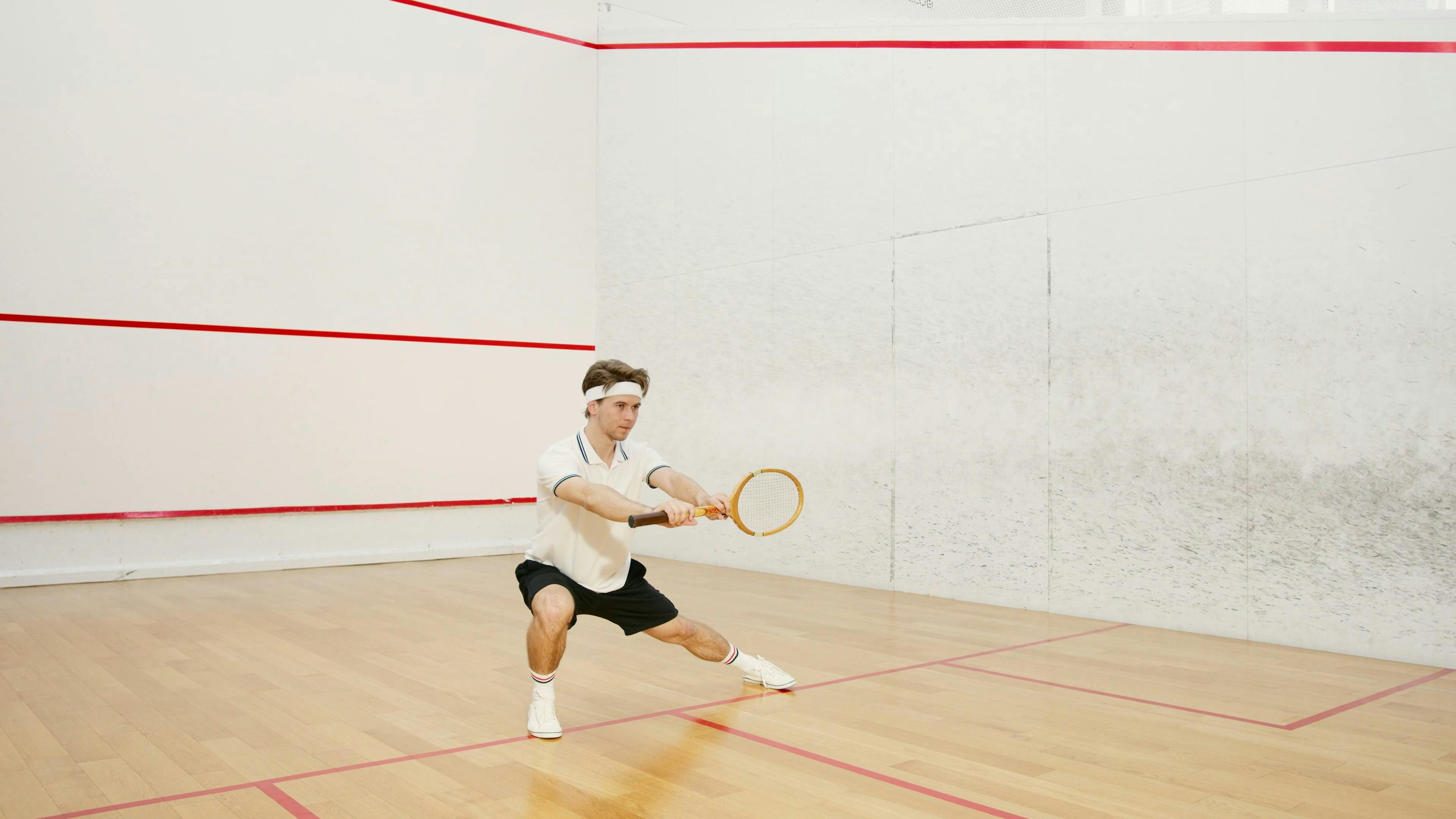 Squash Player Stretching In The Court · Free Stock Video