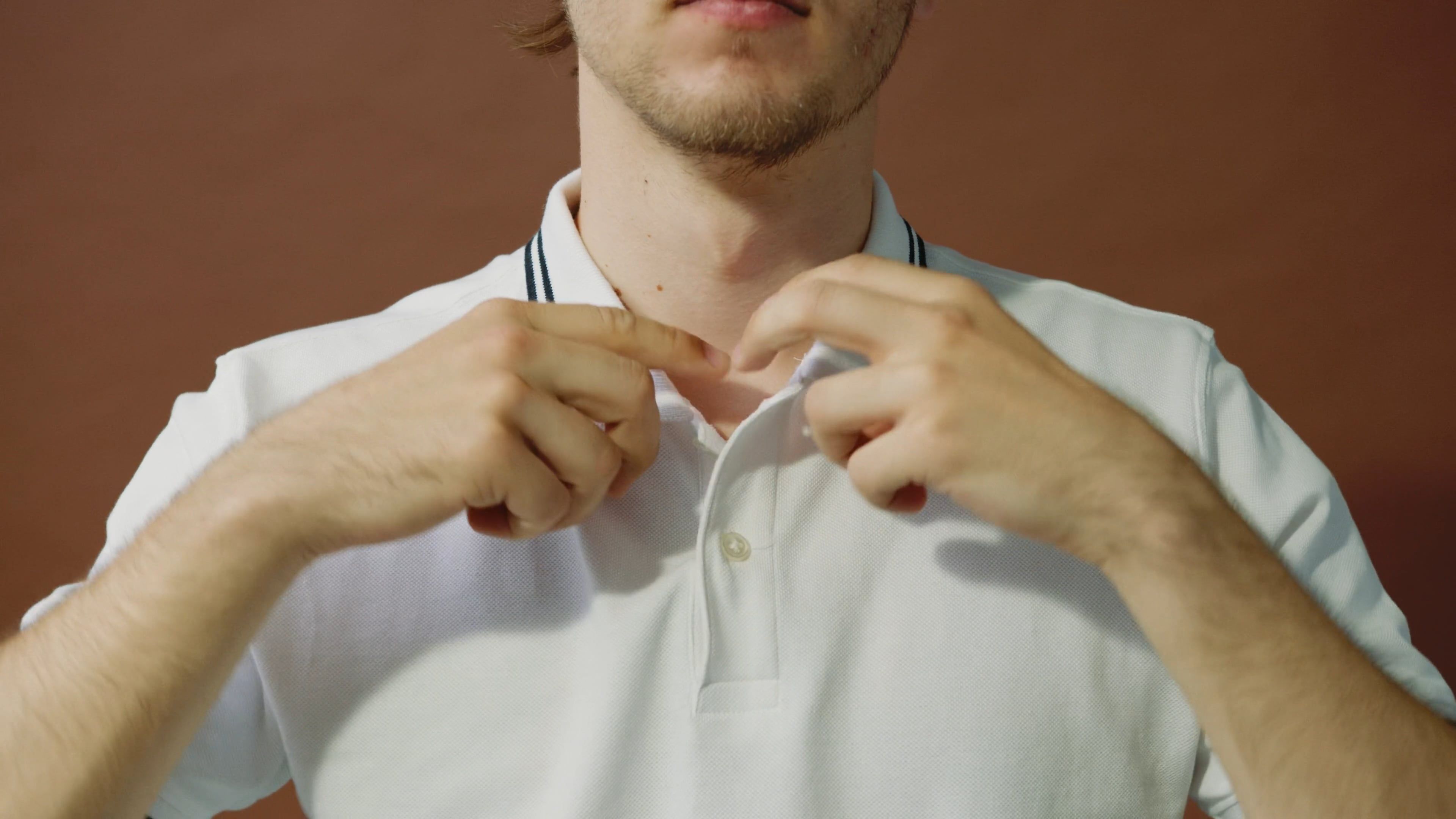 Man Wearing a White Polo Shirt · Free Stock Video