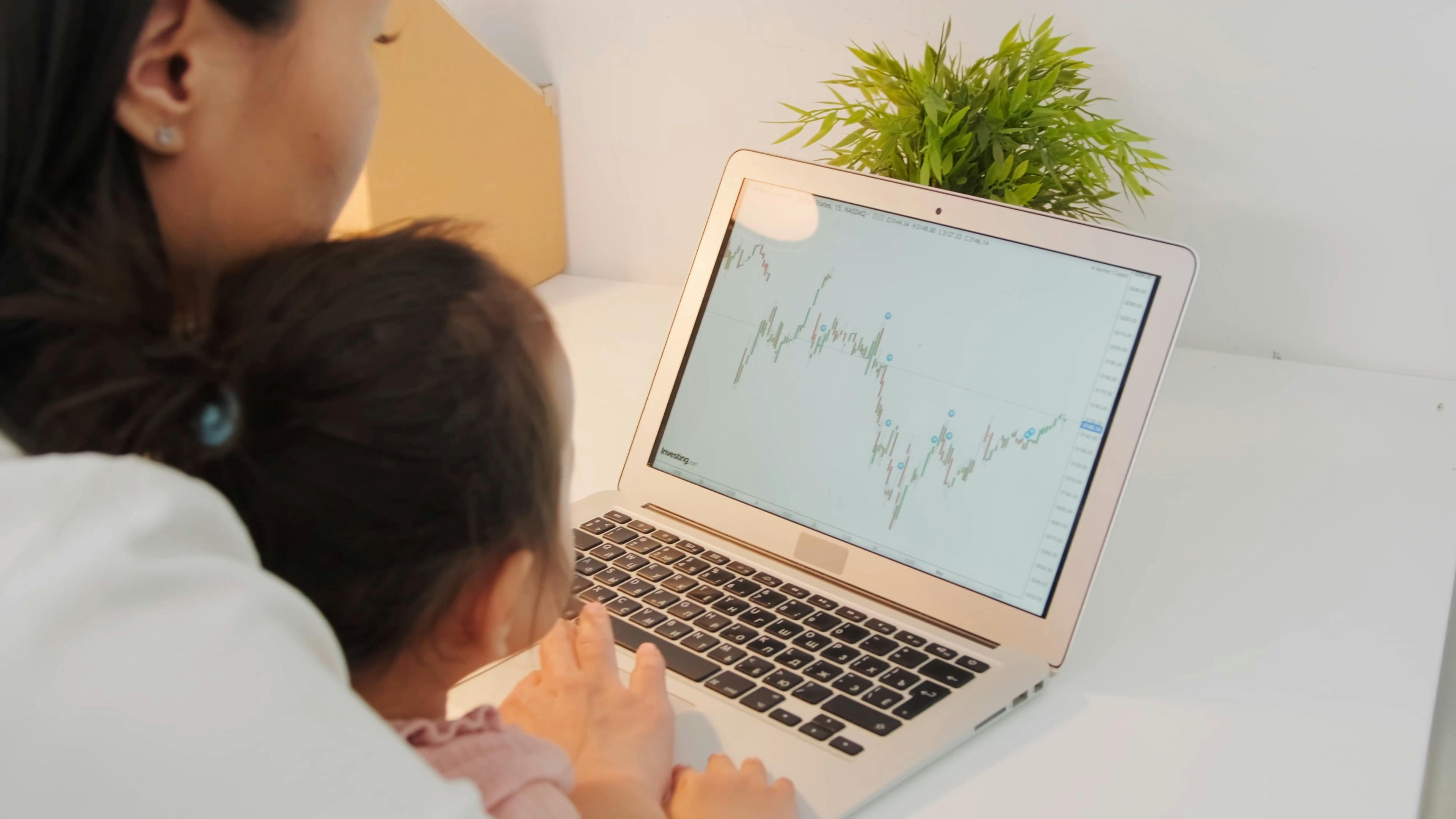 Woman Using a Computer With Her Child Free Stock Video Footage, Royalty ...