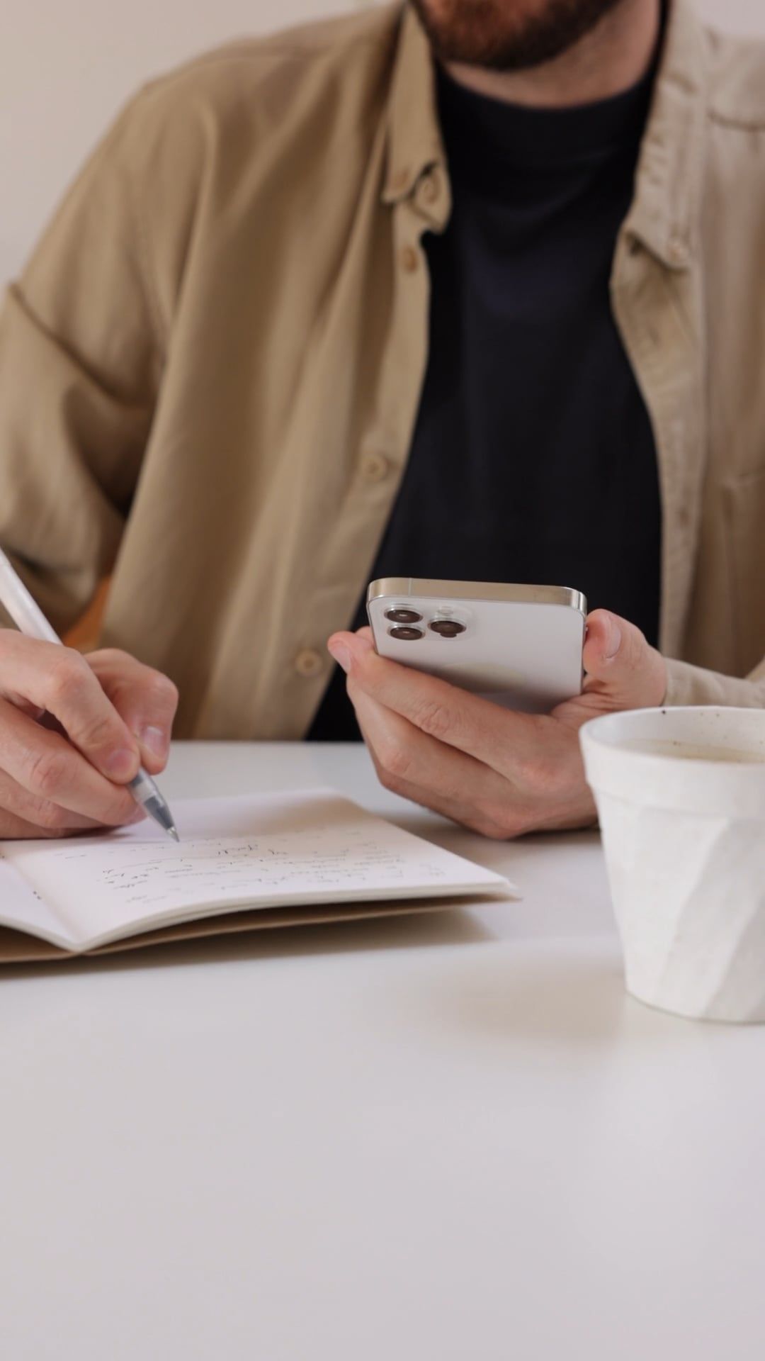 Person Holding Smartphone While Writing Free Stock Video Footage ...
