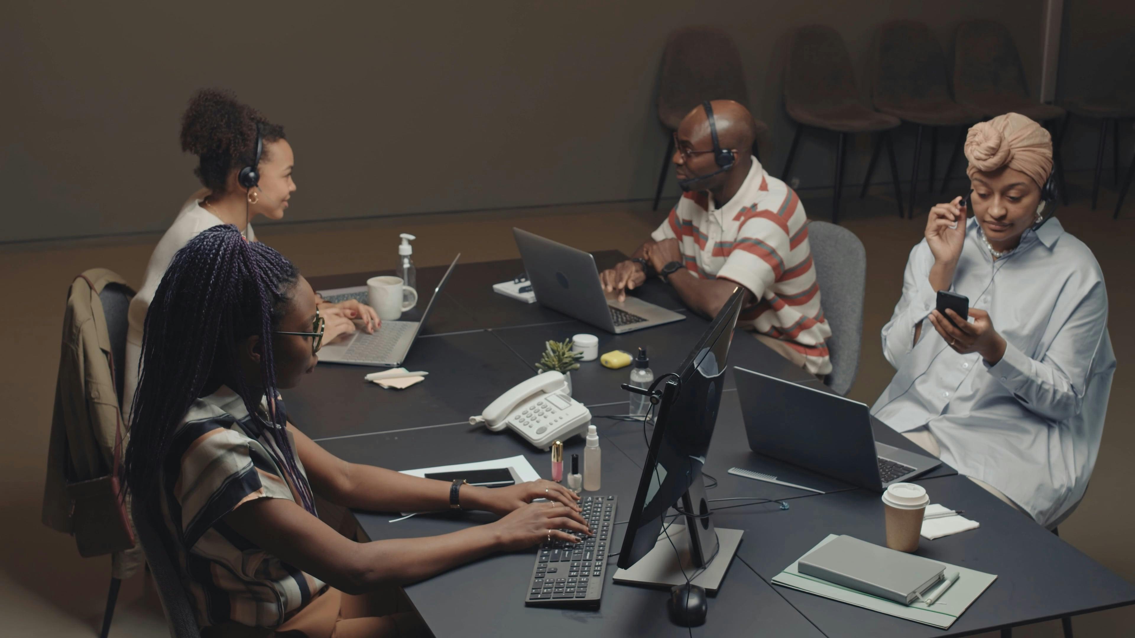 A Relaxed Call Center Guy Talking to Customer · Free Stock Video