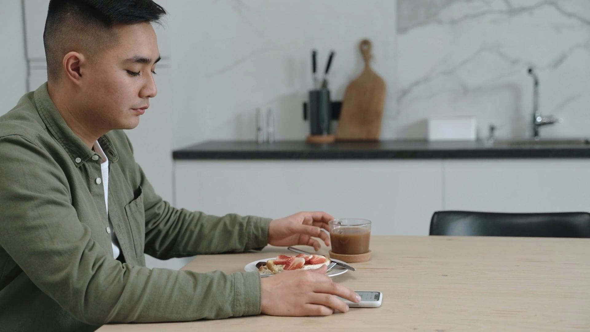 Man Eating while using Smartphone Free Stock Video Footage, Royalty ...