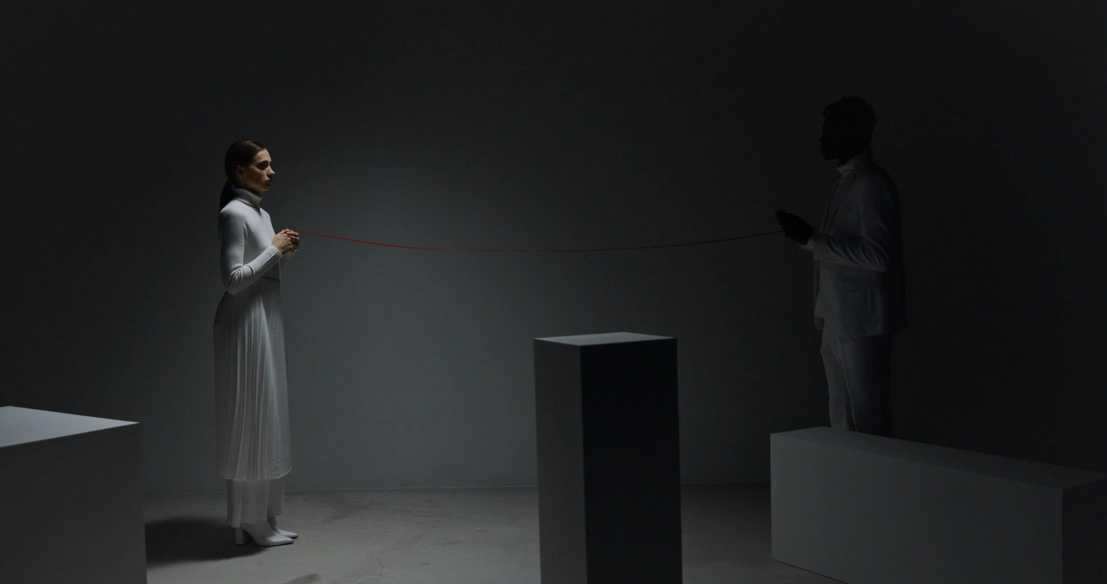Man Walking Towards Woman while Holding Red String Free Stock Video Footage, Royalty-Free 4K ...