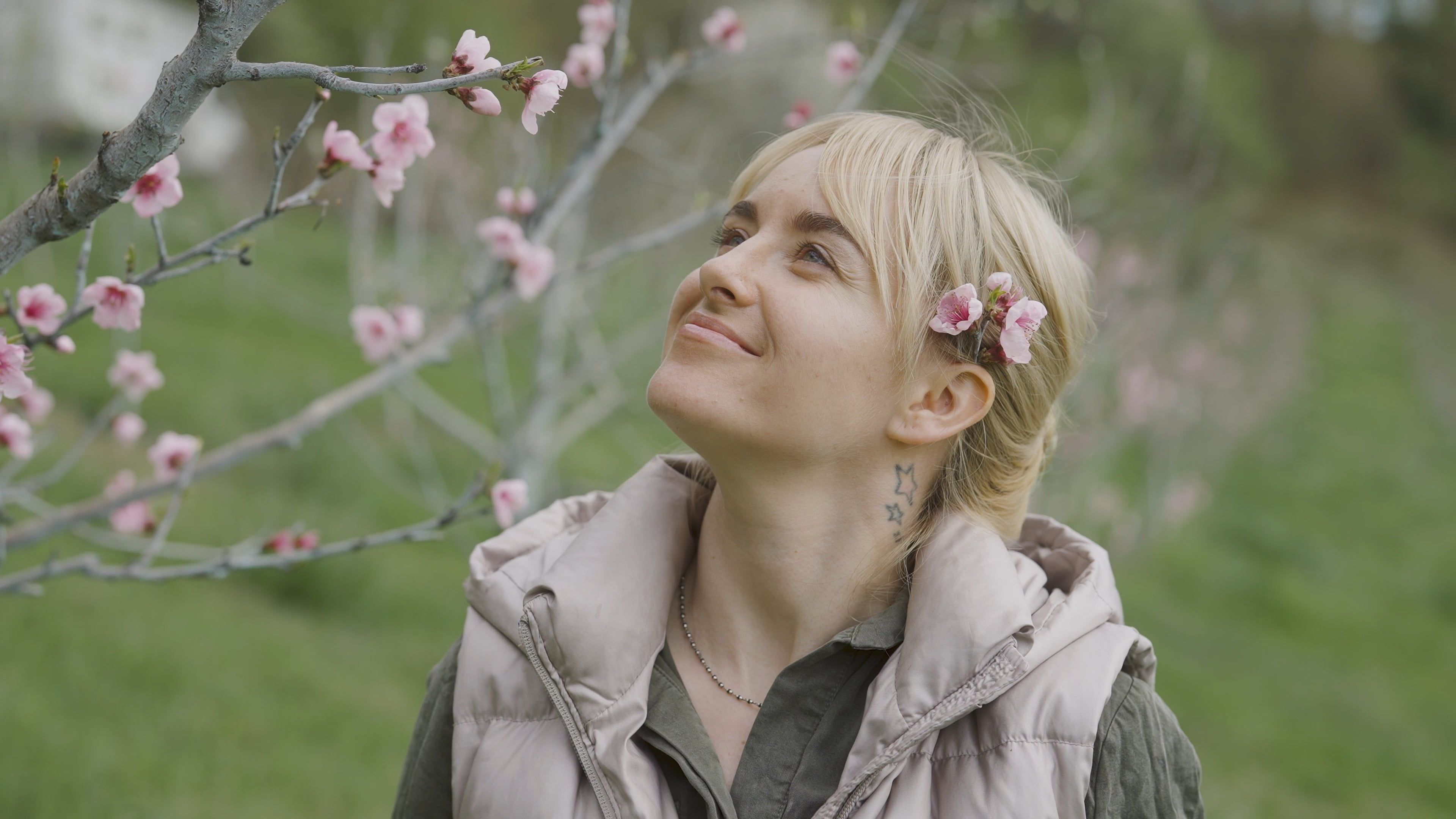 A Woman Putting a Flower Behind Her Ear Free Stock Video Footage ...
