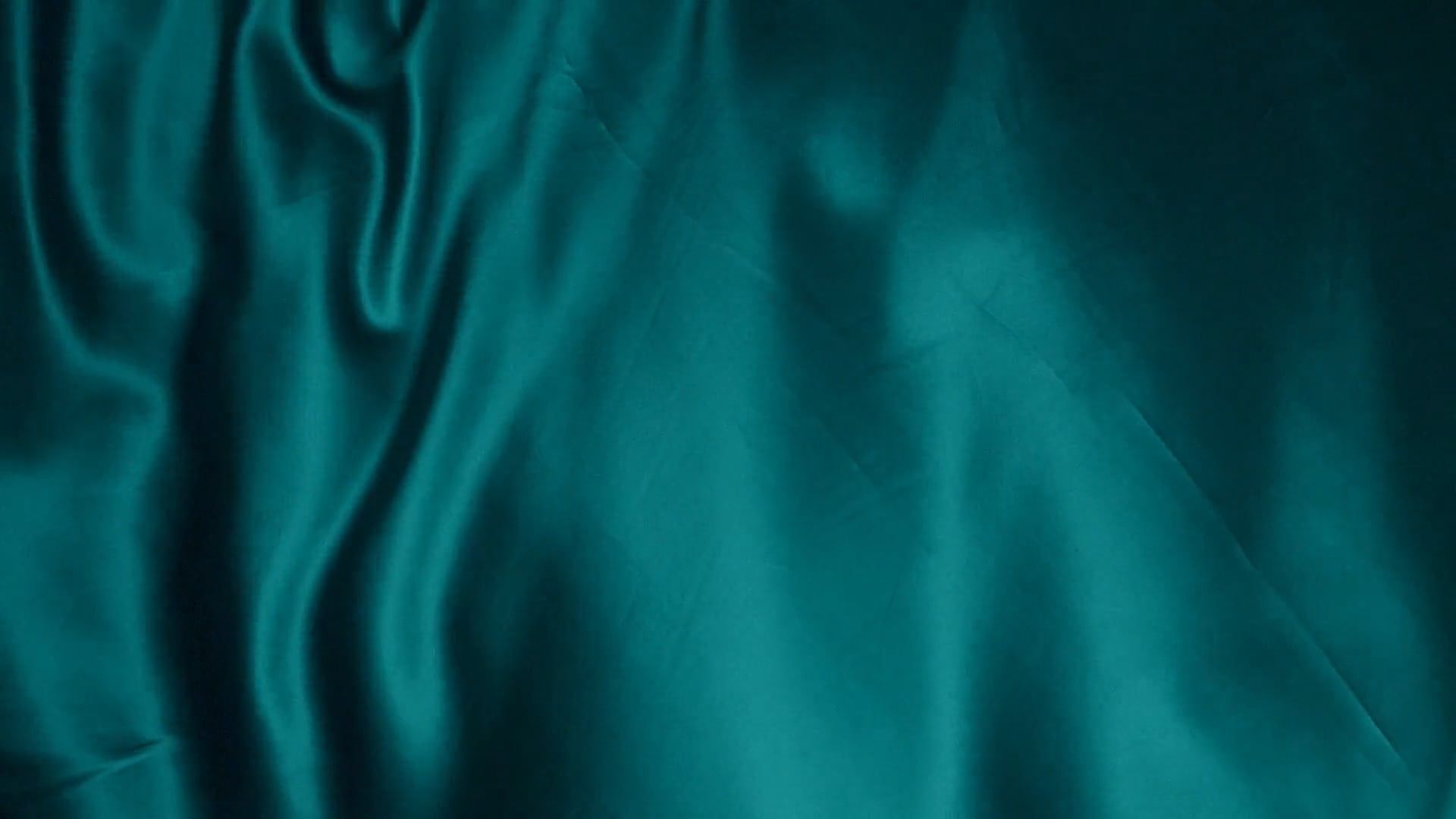 Close-Up Video of a Green Silk Cloth · Free Stock Video