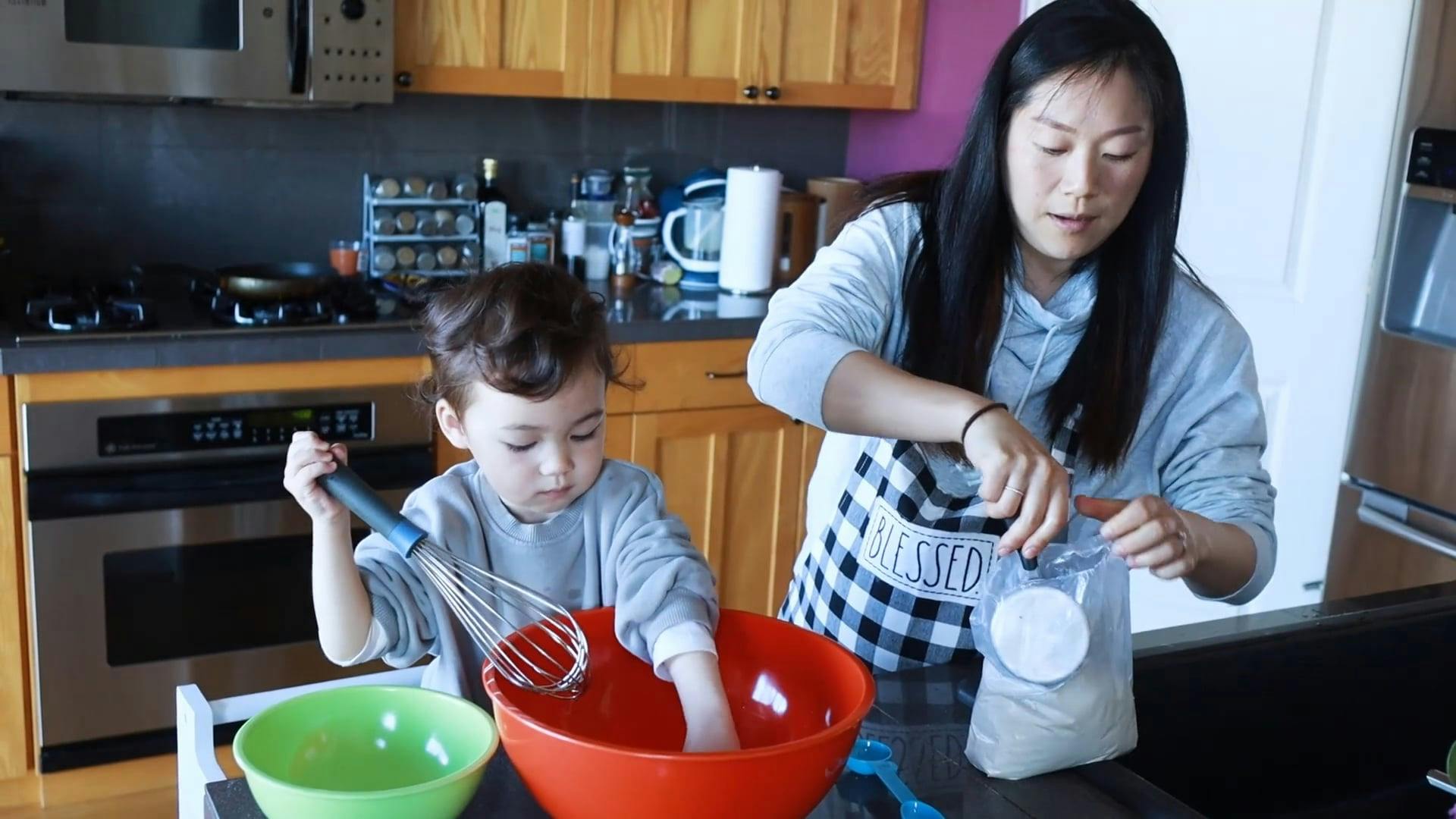 A Child Mixing Flour on a Bowl · Free Stock Video