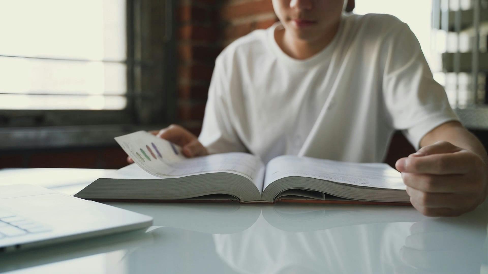 A Person Getting Book on the Book Shelf Free Stock Video Footage ...