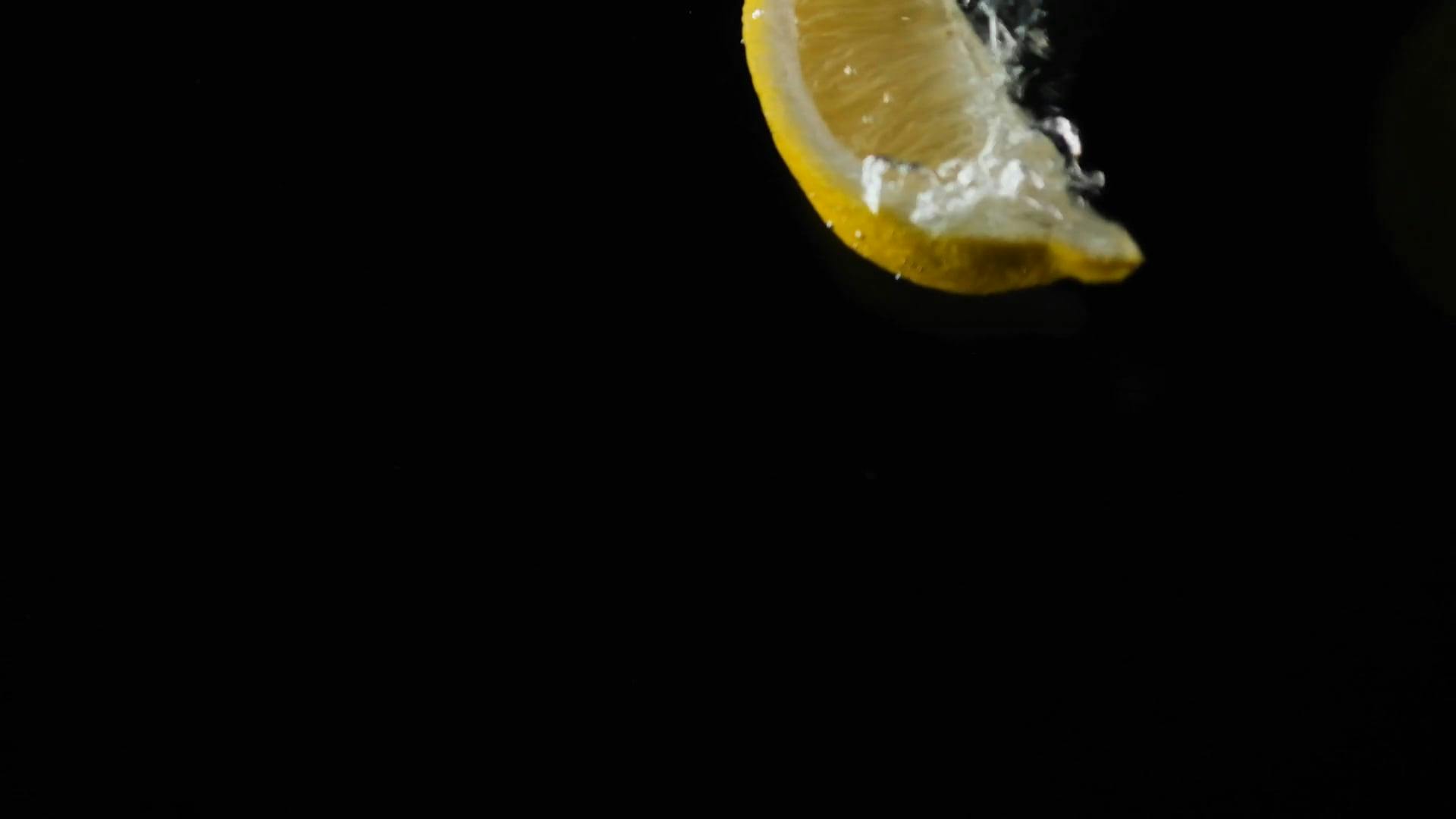 Slices of Lemon Dropped on Water Free Stock Video Footage, Royalty-Free ...