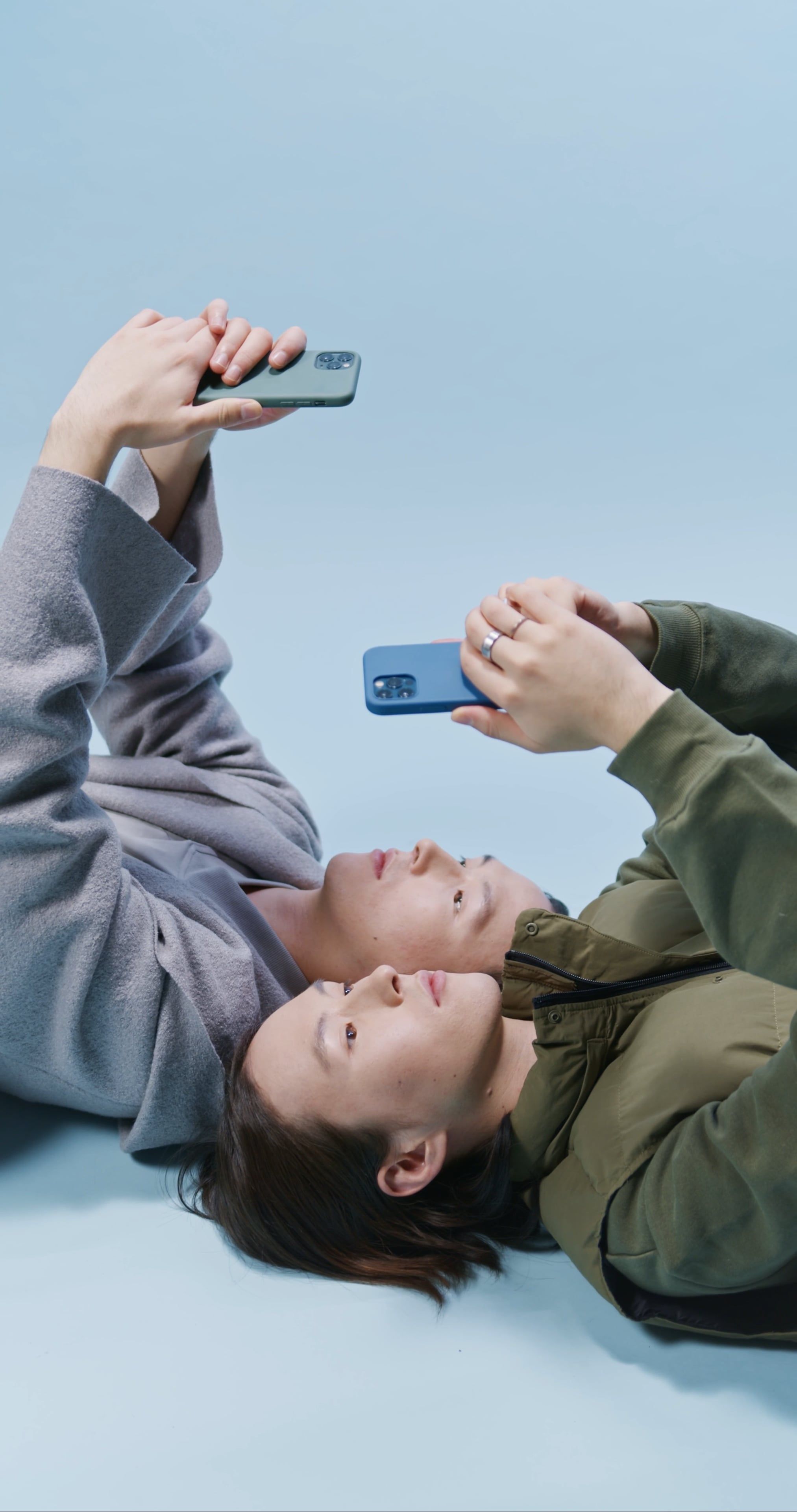 Men Lying on the Floor Using their Cellphones · Free Stock Video