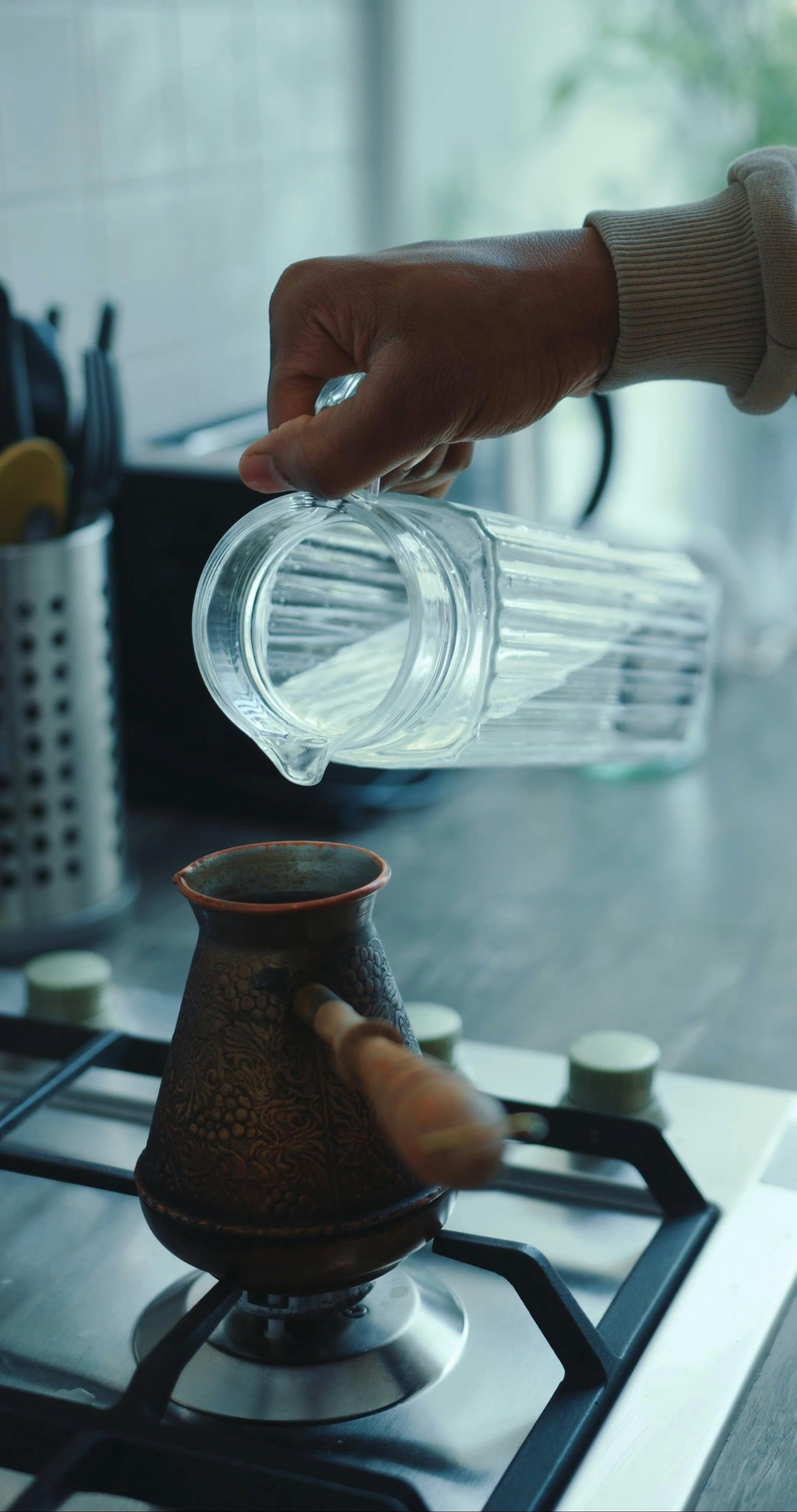 A Person Pouring Water in a Cookware Free Stock Video Footage, Royalty ...