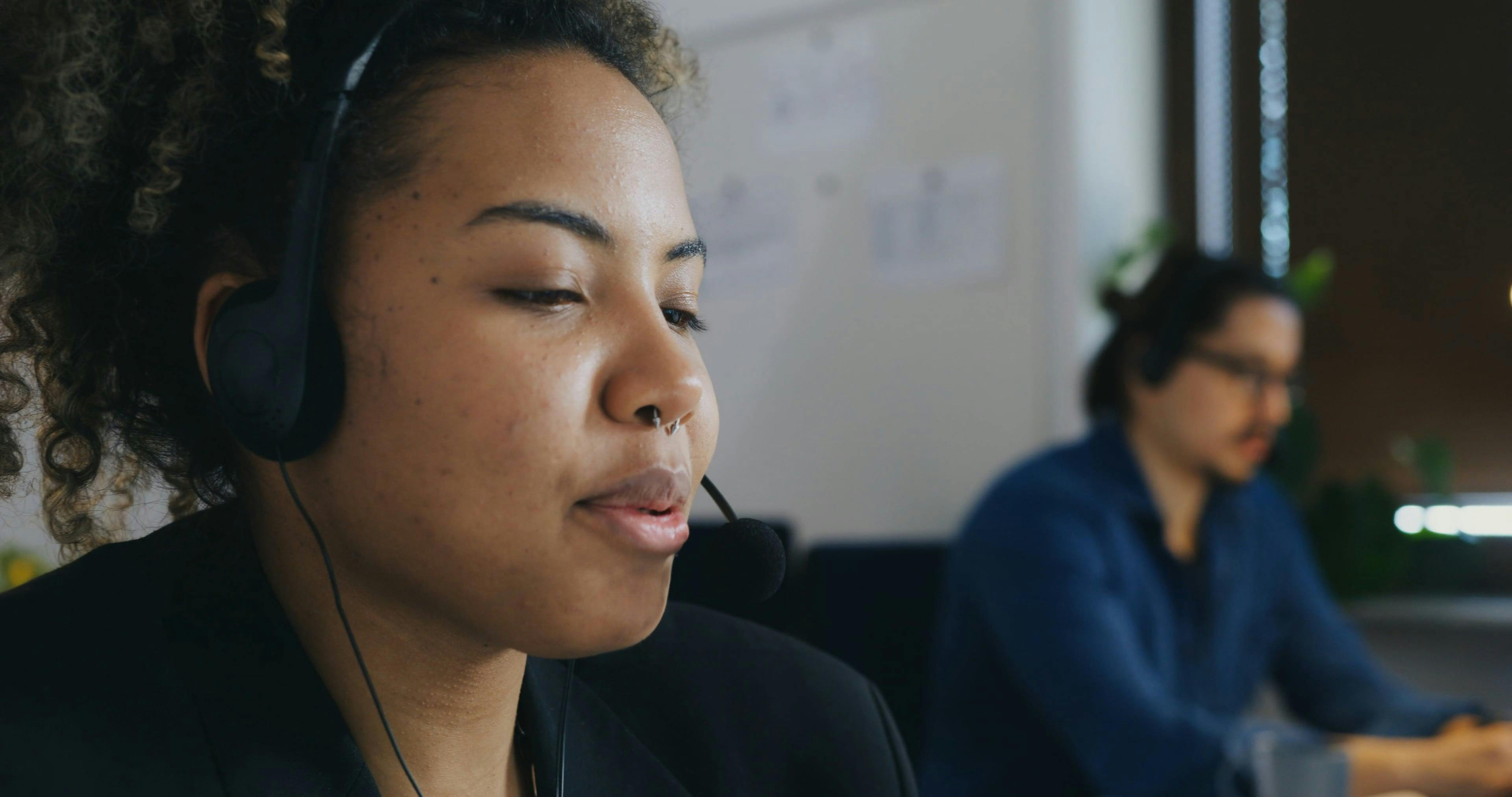 A Call Center Agent Talking to a Client · Free Stock Video