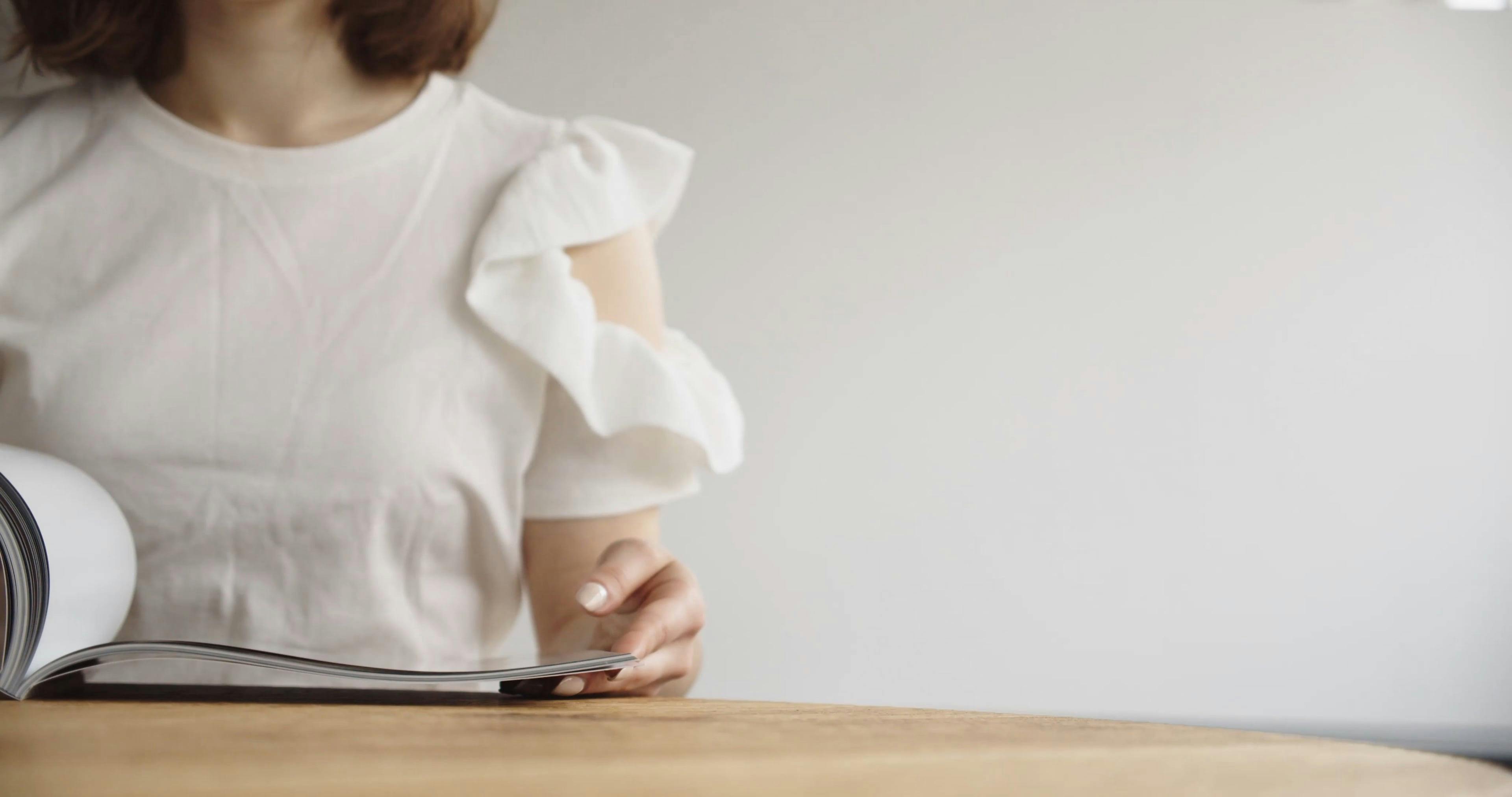 Woman Browsing a Magazine Free Stock Video Footage, Royalty-Free 4K ...