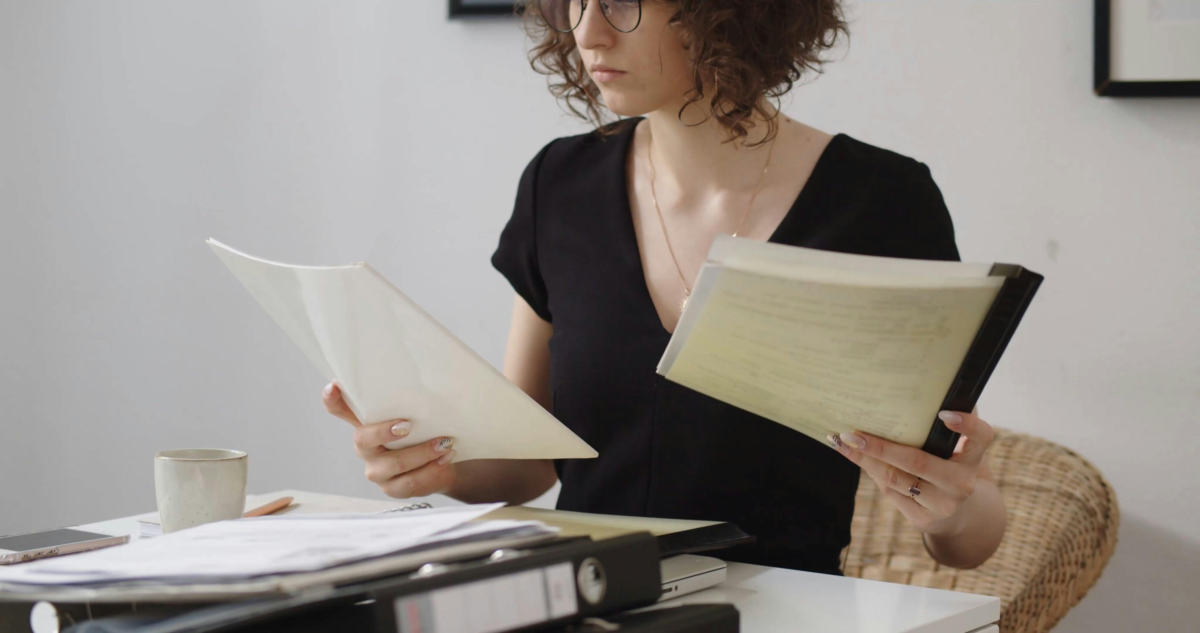 A Person Finding a Document · Free Stock Video