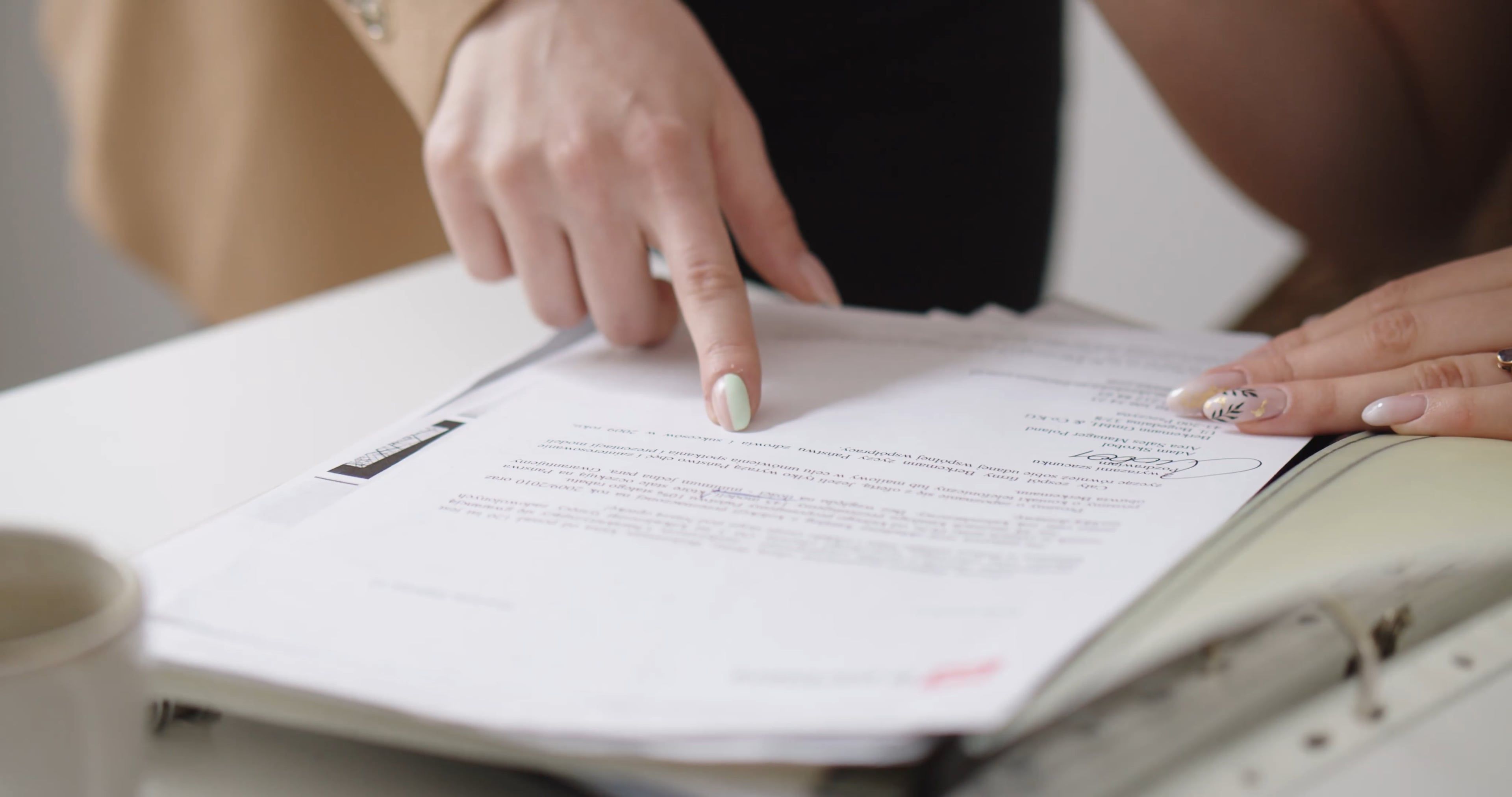 People at Work Discussing a Document · Free Stock Video