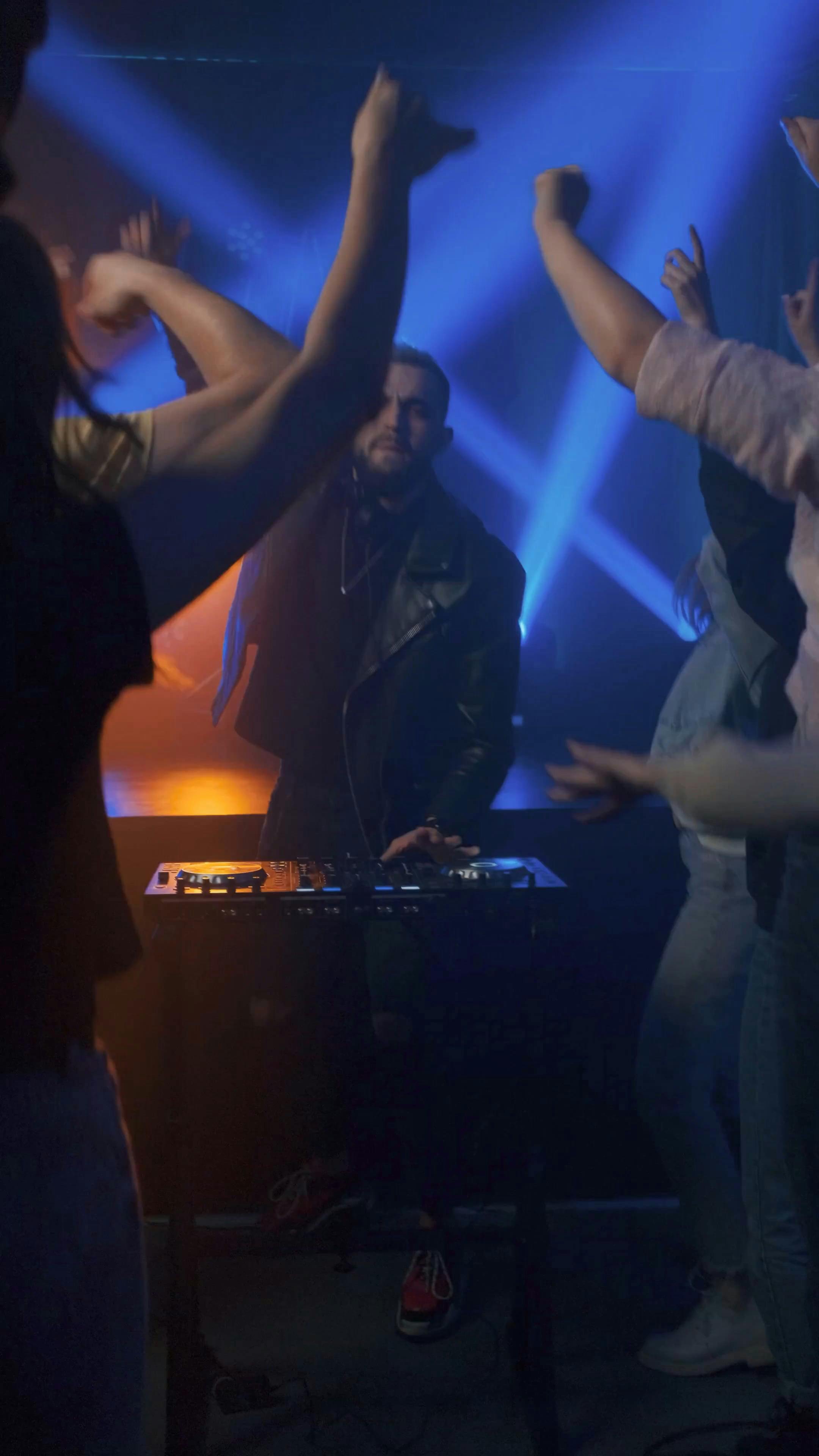 A DJ Performing in front of a Crowd · Free Stock Video