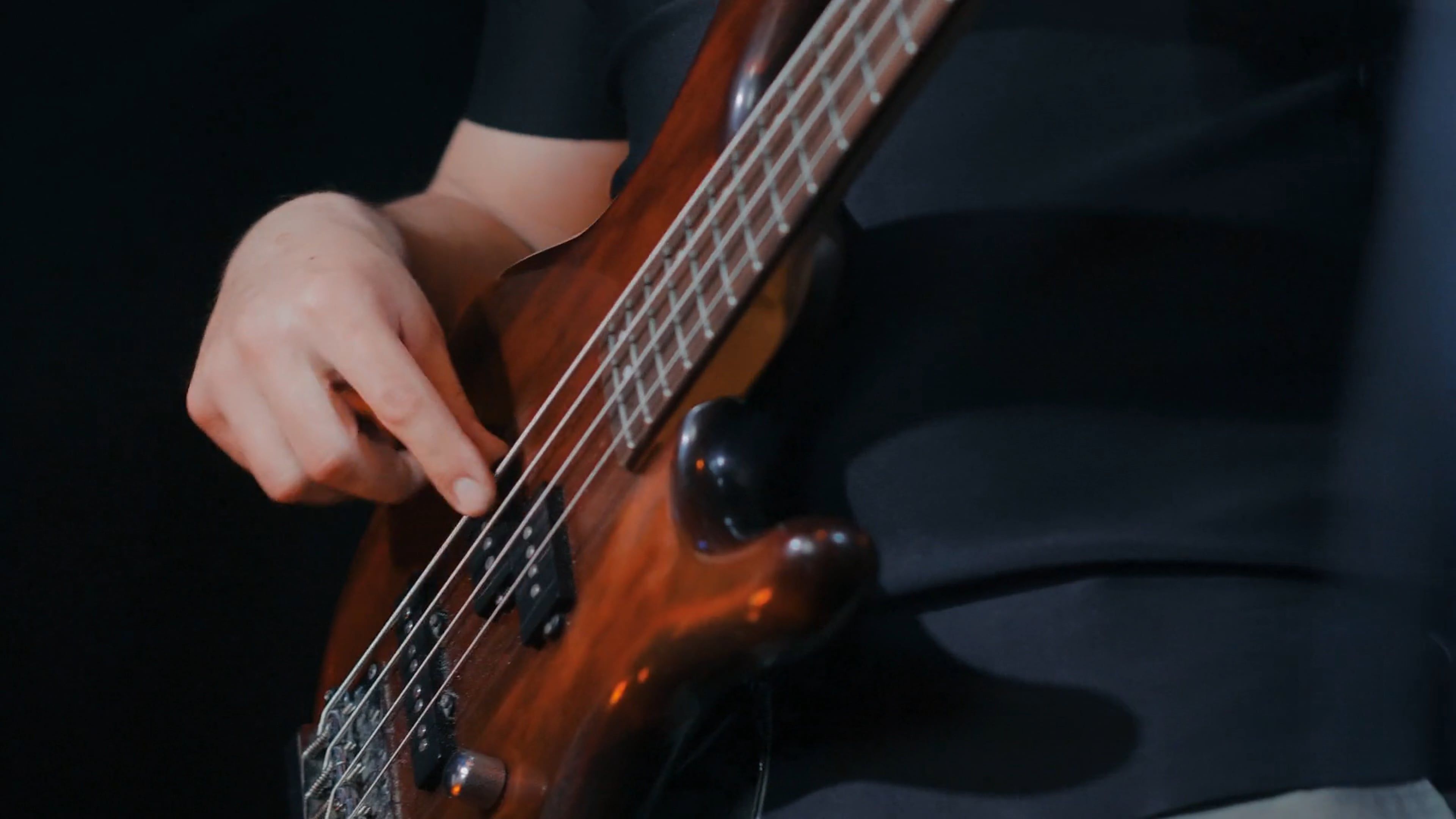 Close-Up Video of a Person Playing a Bass Guitar Free Stock Video ...