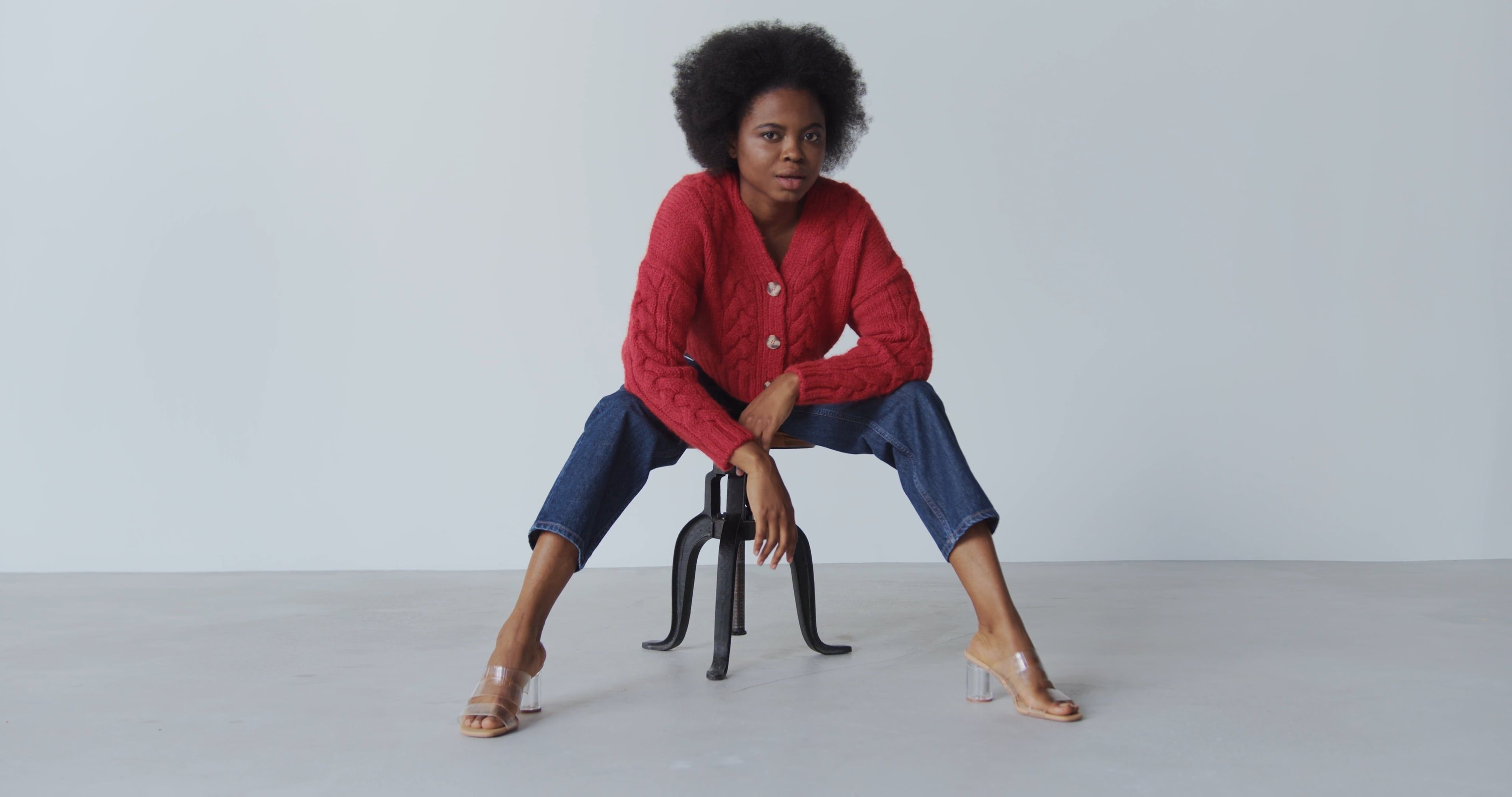 Woman Sitting on a Stool Posing · Free Stock Video