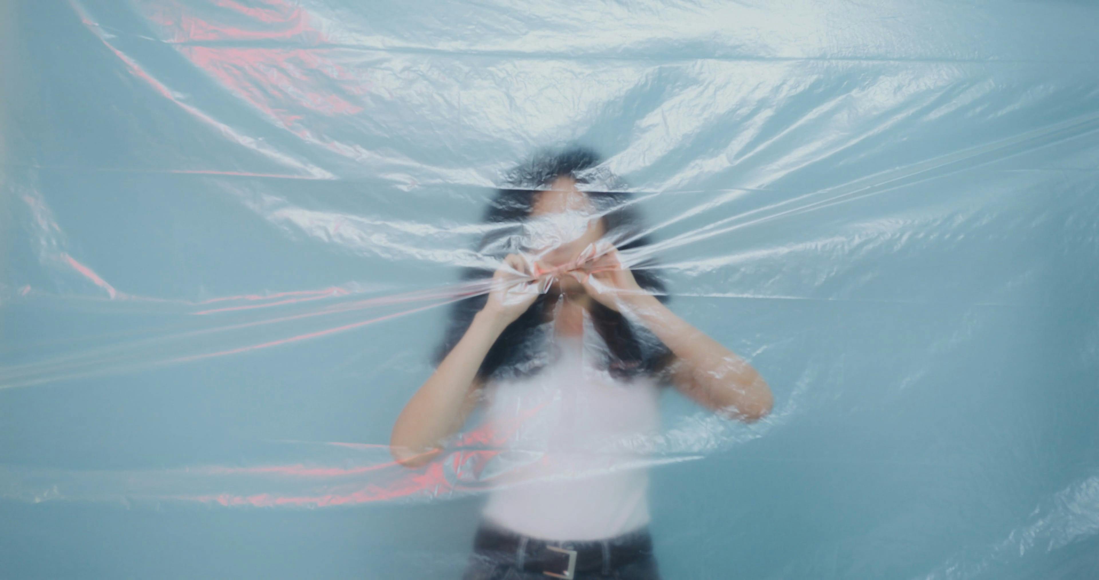 A Woman Tearing the Plastic Cover Free Stock Video Footage, Royalty ...