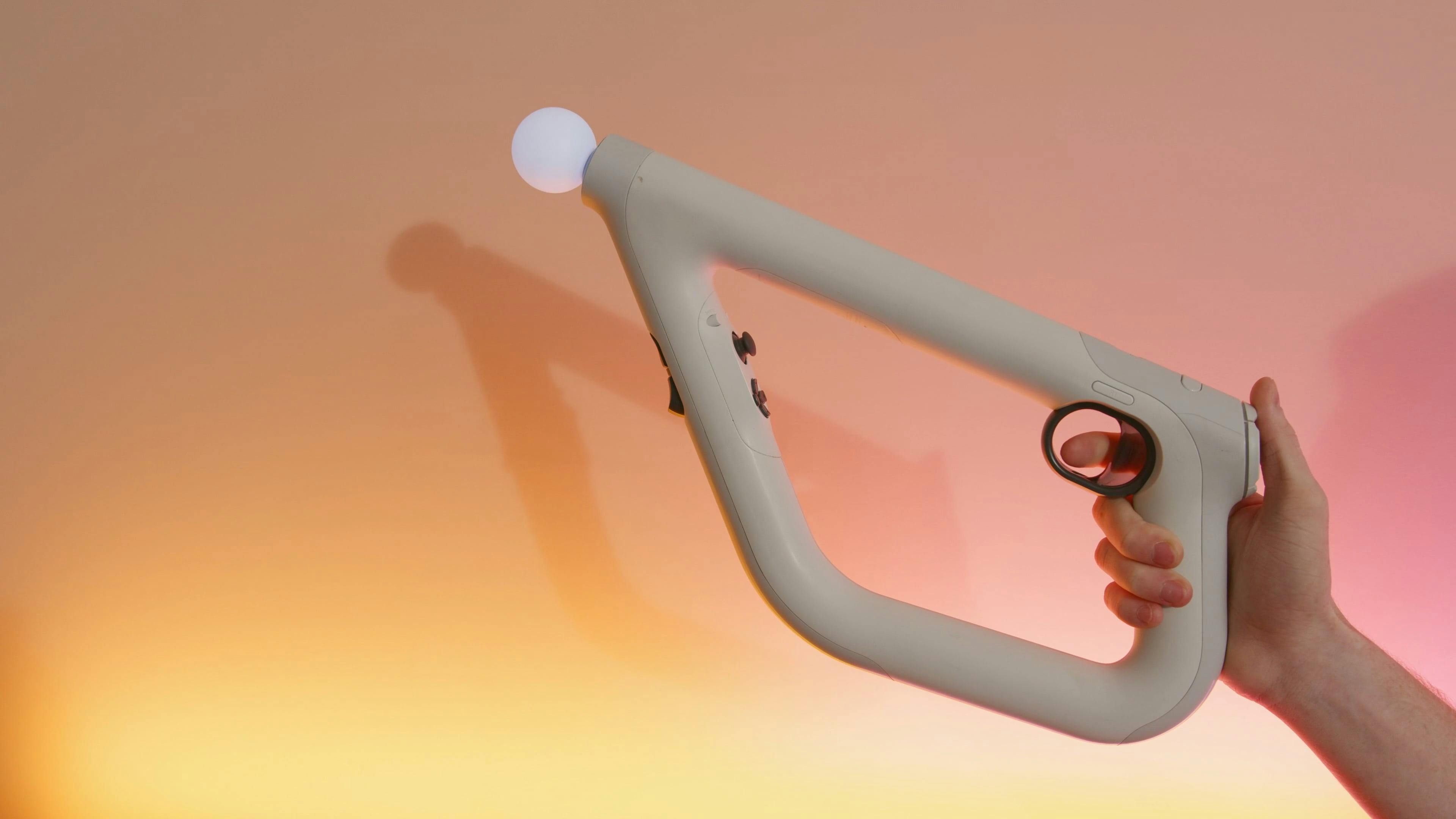 A Person Pressing the Trigger on a Playstation VR Aim Controller Free ...