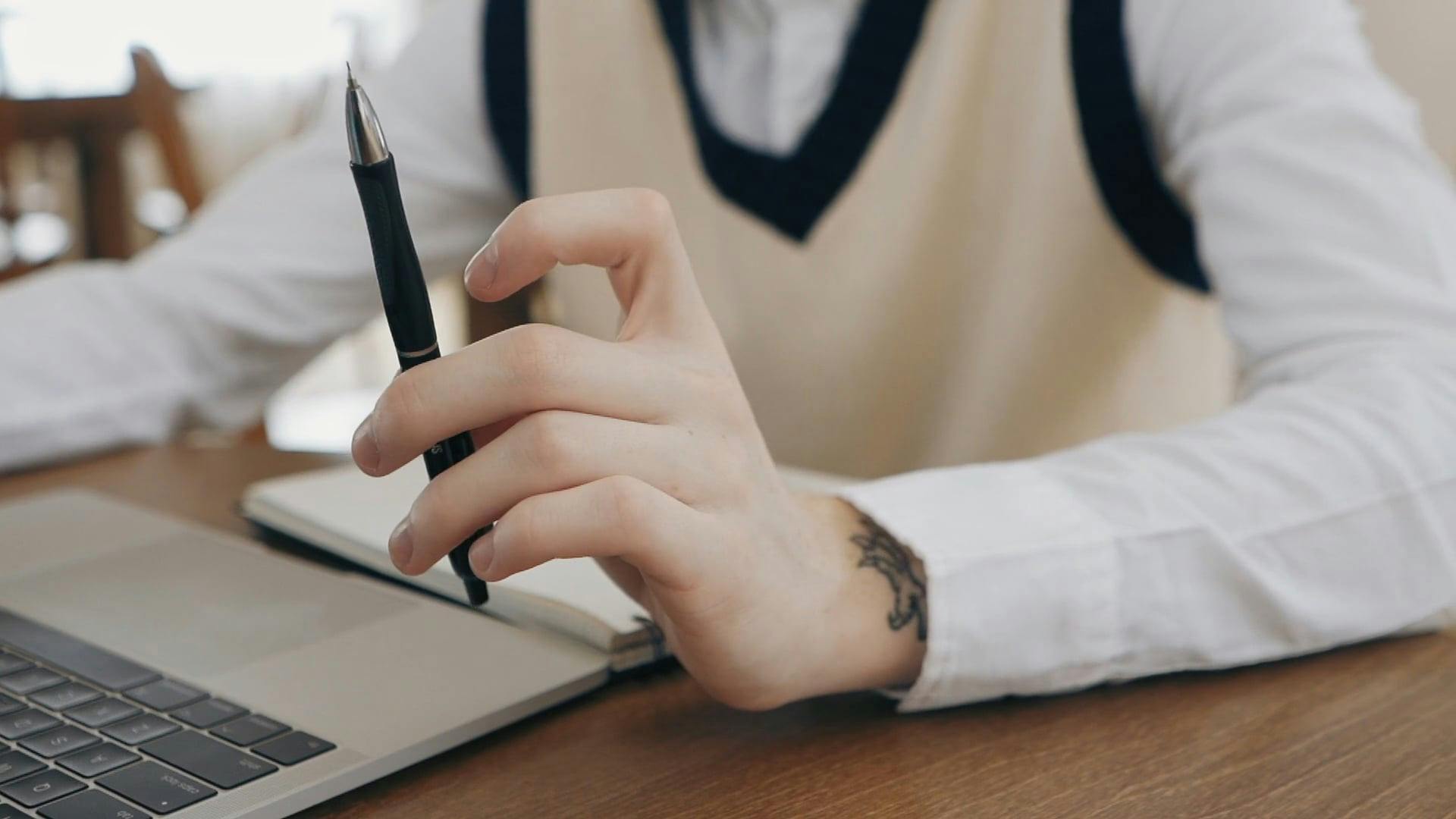 A Man Holding a Pen · Free Stock Video