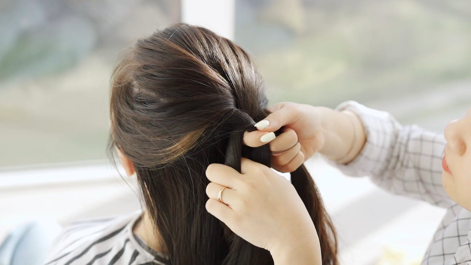 A Woman Braiding Someone's Hair Free Stock Video Footage, Royalty-Free ...