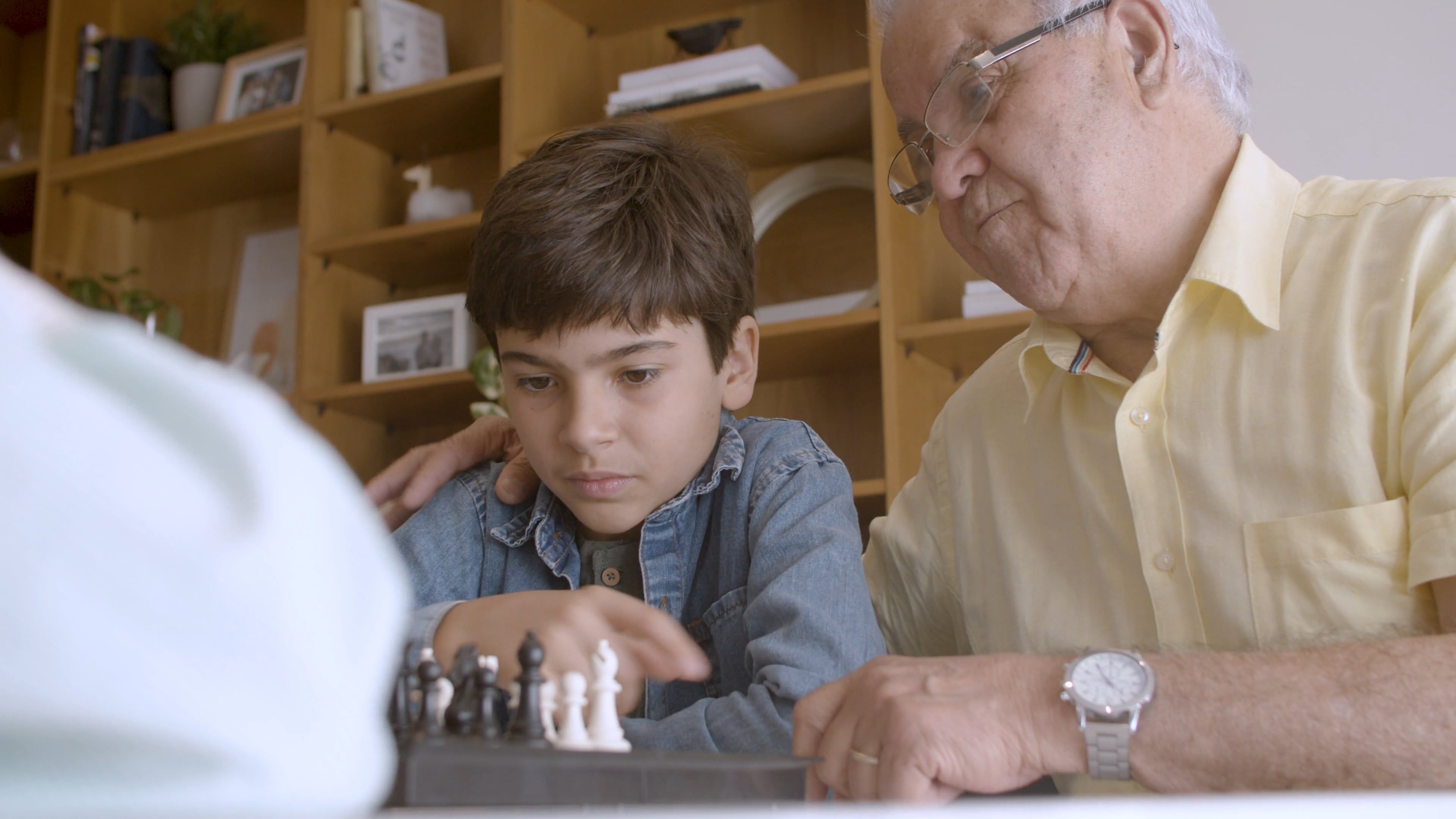 Grandparents Teaching Their Grandchildren on How to Play Chess · Free ...