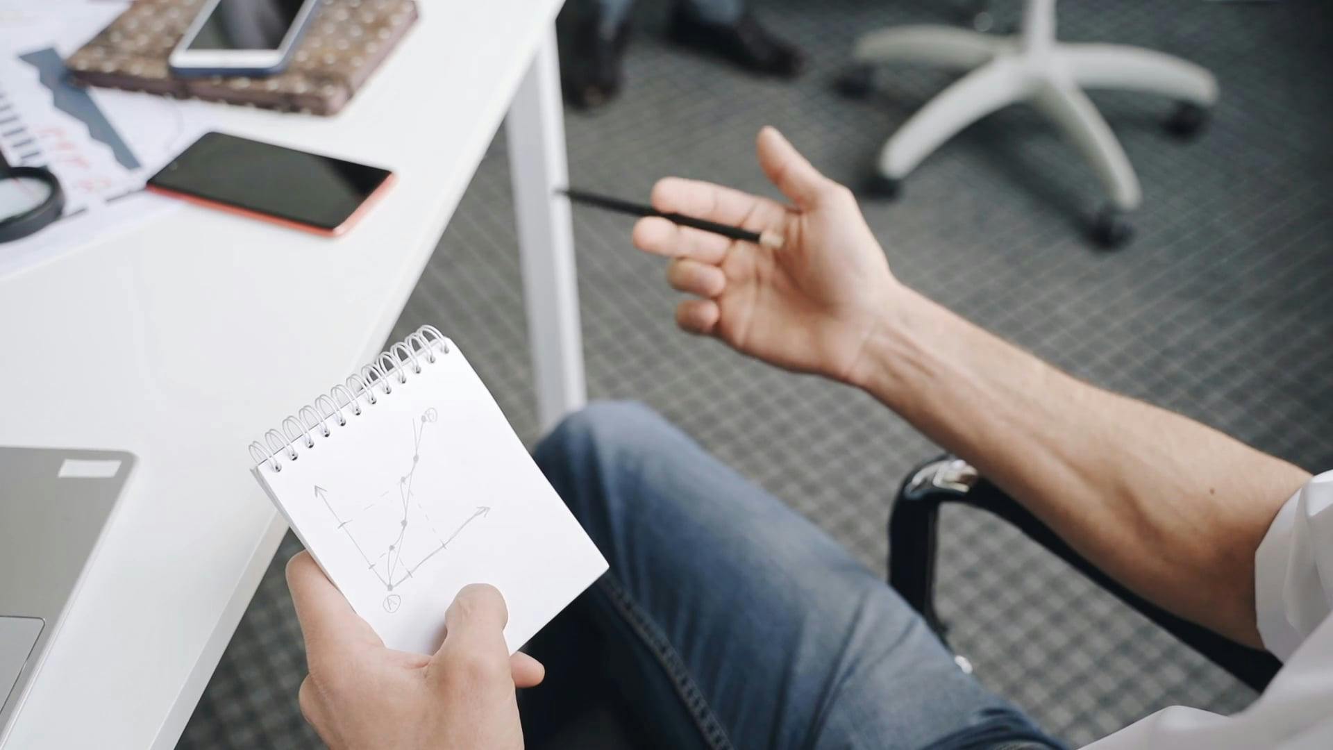 A Man Holding A Graph · Free Stock Video