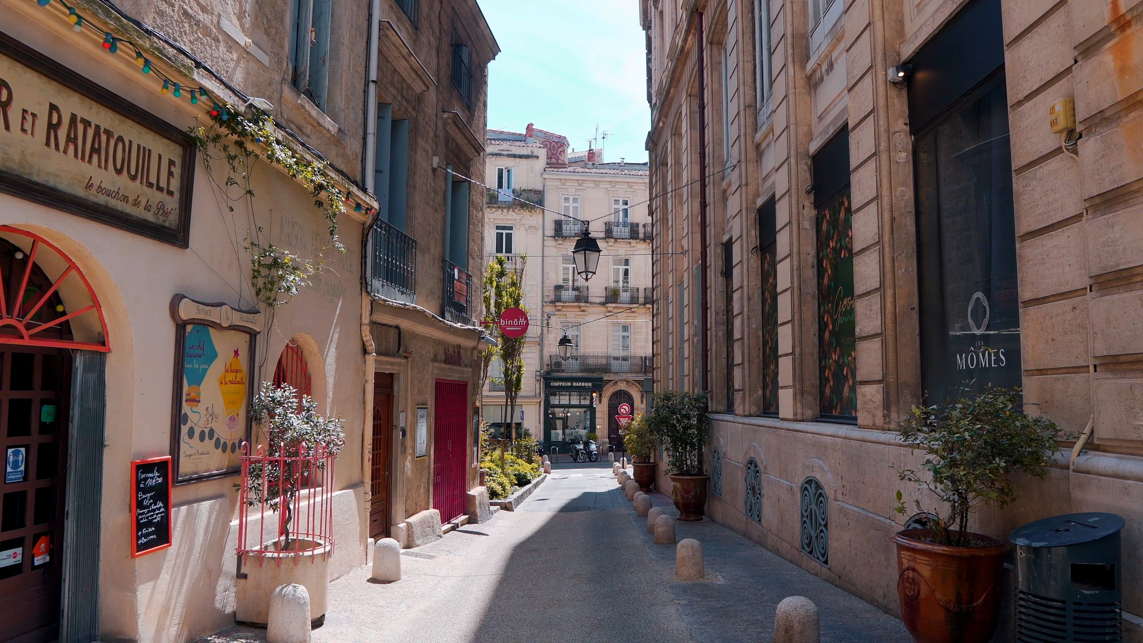 A Long Shot of Street with Establishments and Buildings Free Stock ...
