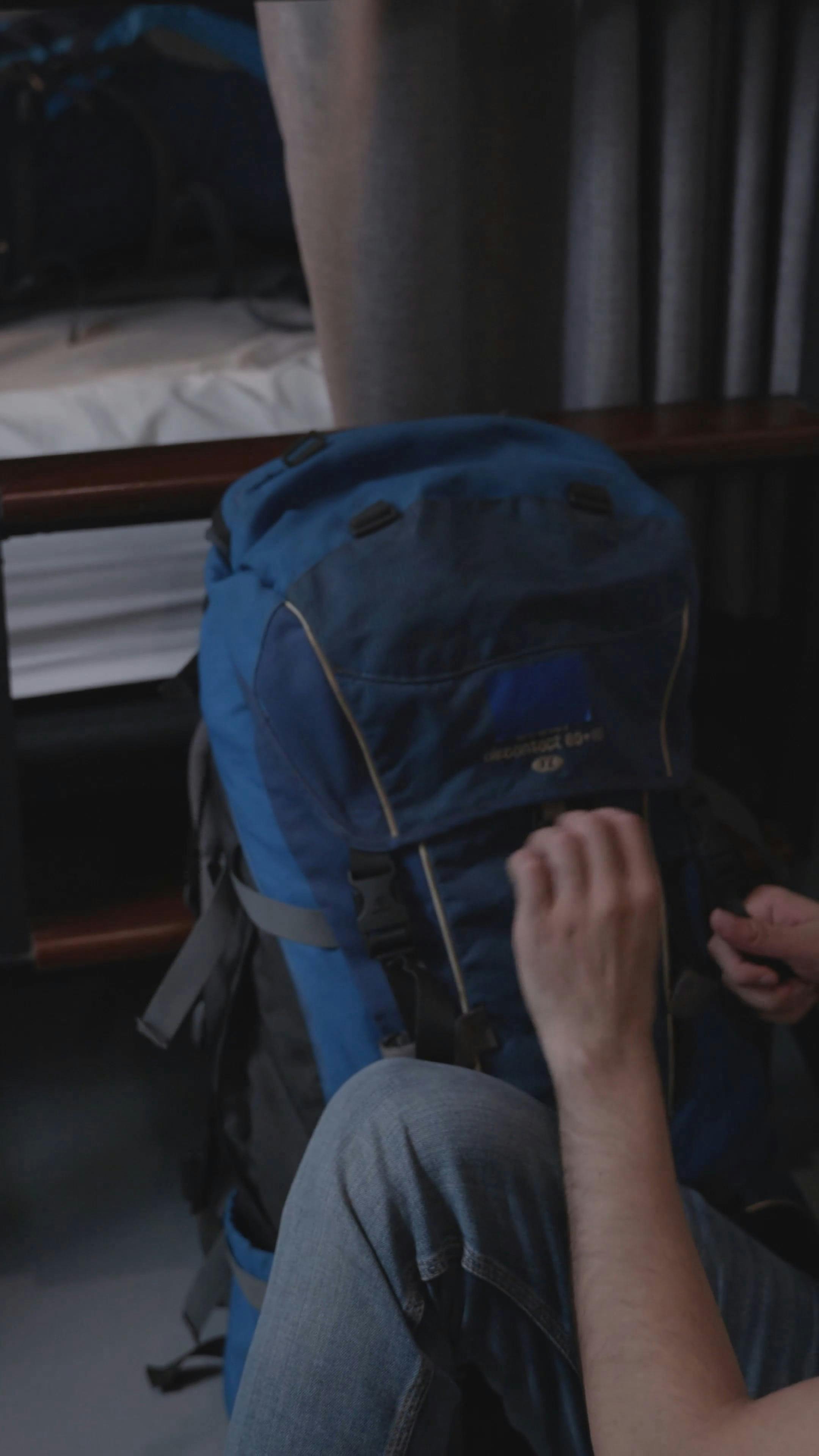 A Man Closing His Travel Backpack Free Stock Video Footage, Royalty ...