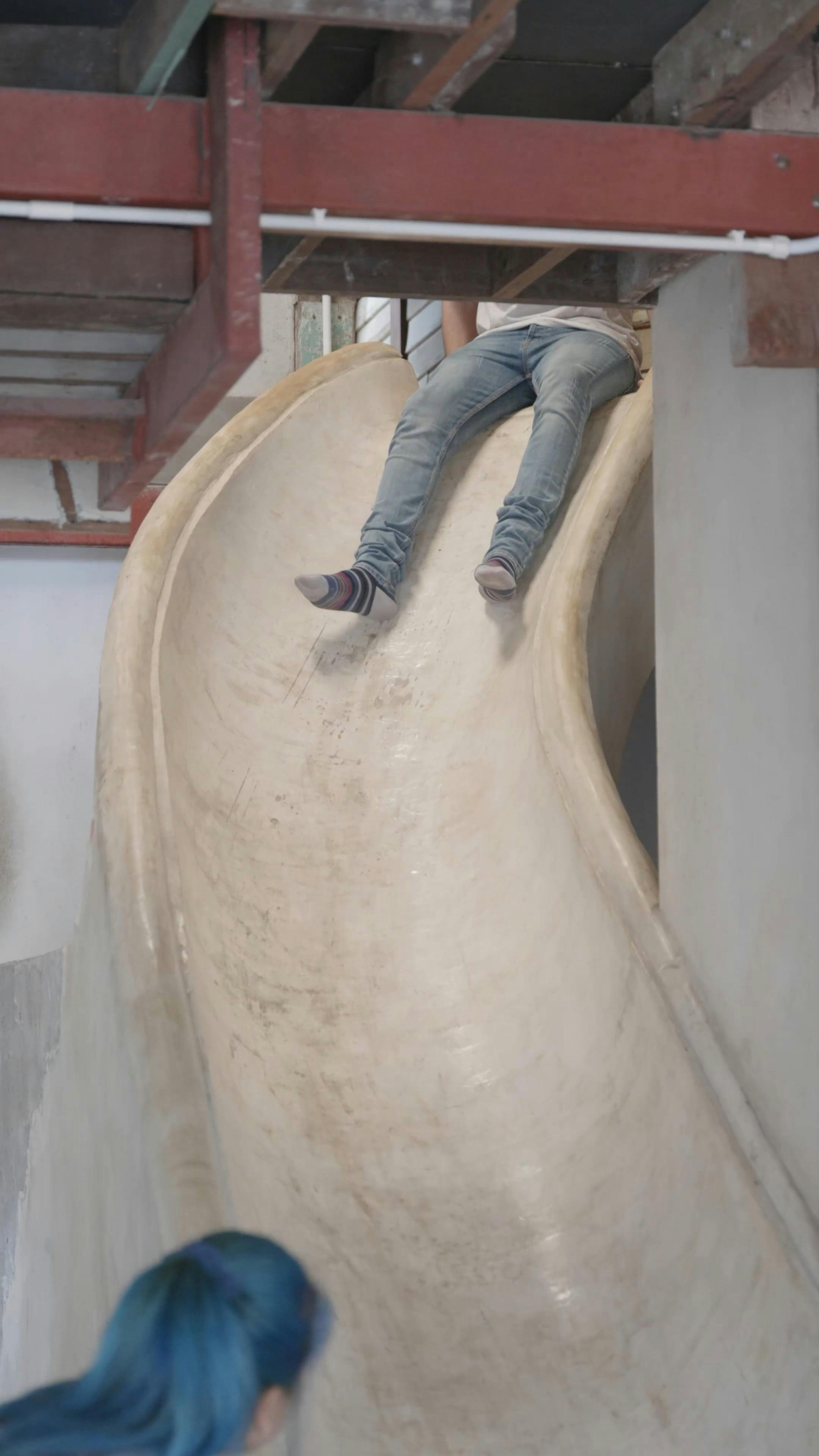 Man Sliding Down the Slide · Free Stock Video