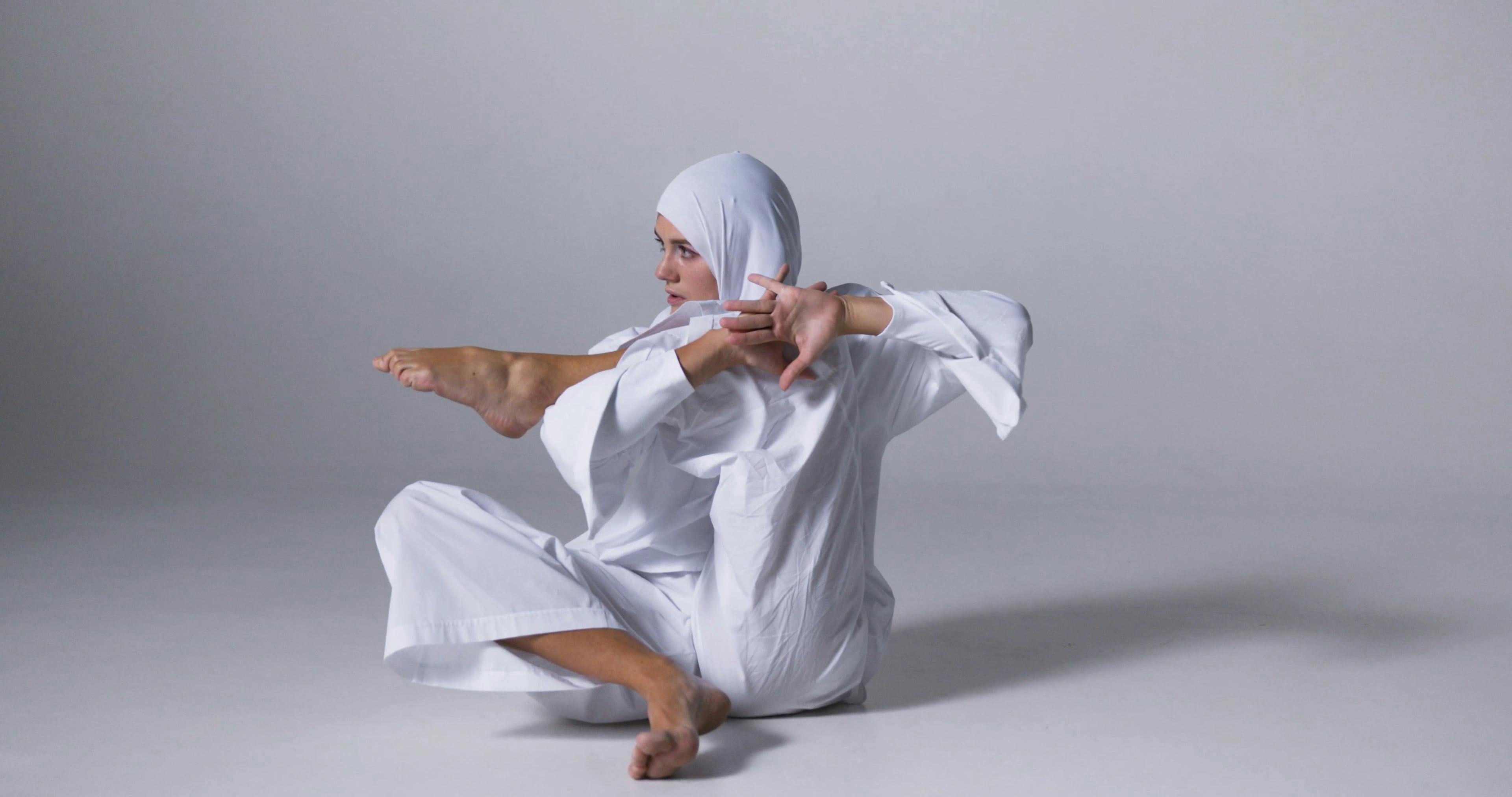 A Dancing Woman In White Abaya Dress · Free Stock Video
