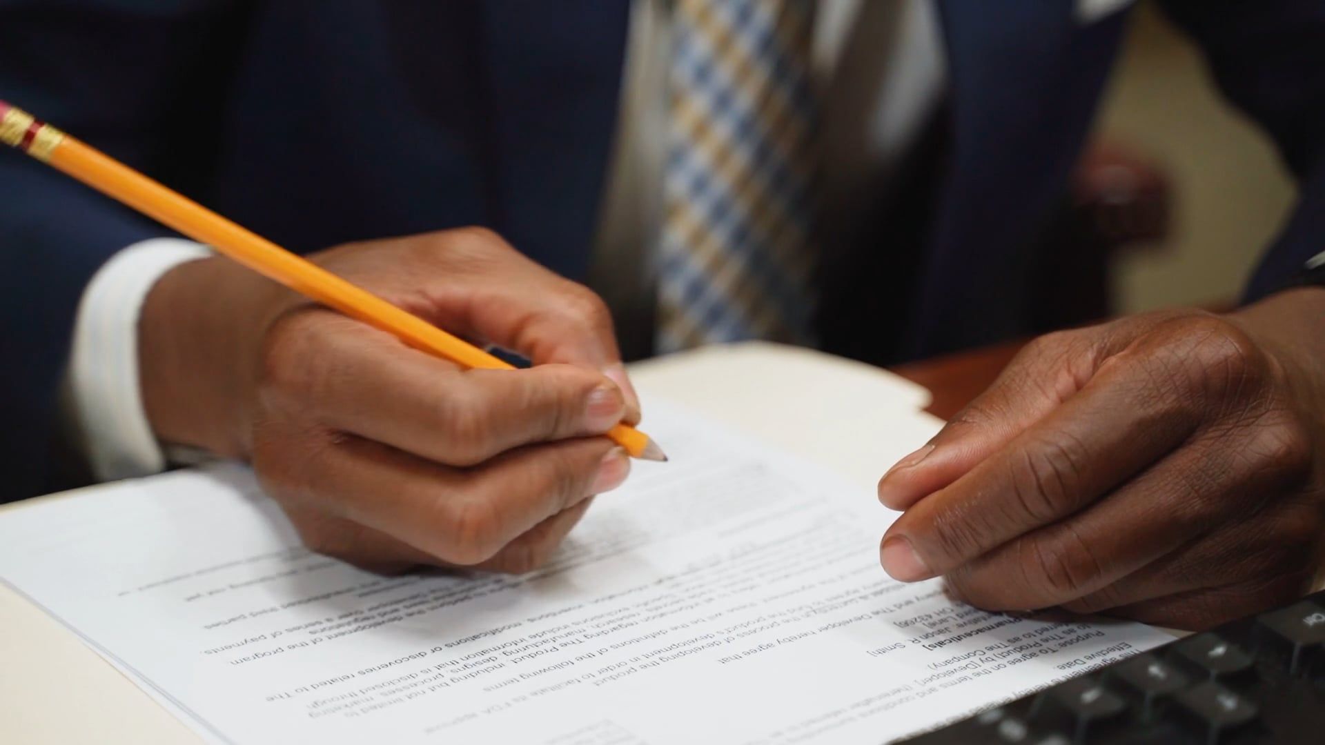 Person Writing on a Document · Free Stock Video