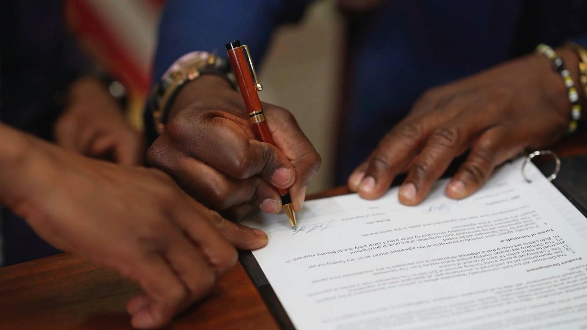 A Close up of a Man Signing a Document Free Stock Video Footage ...