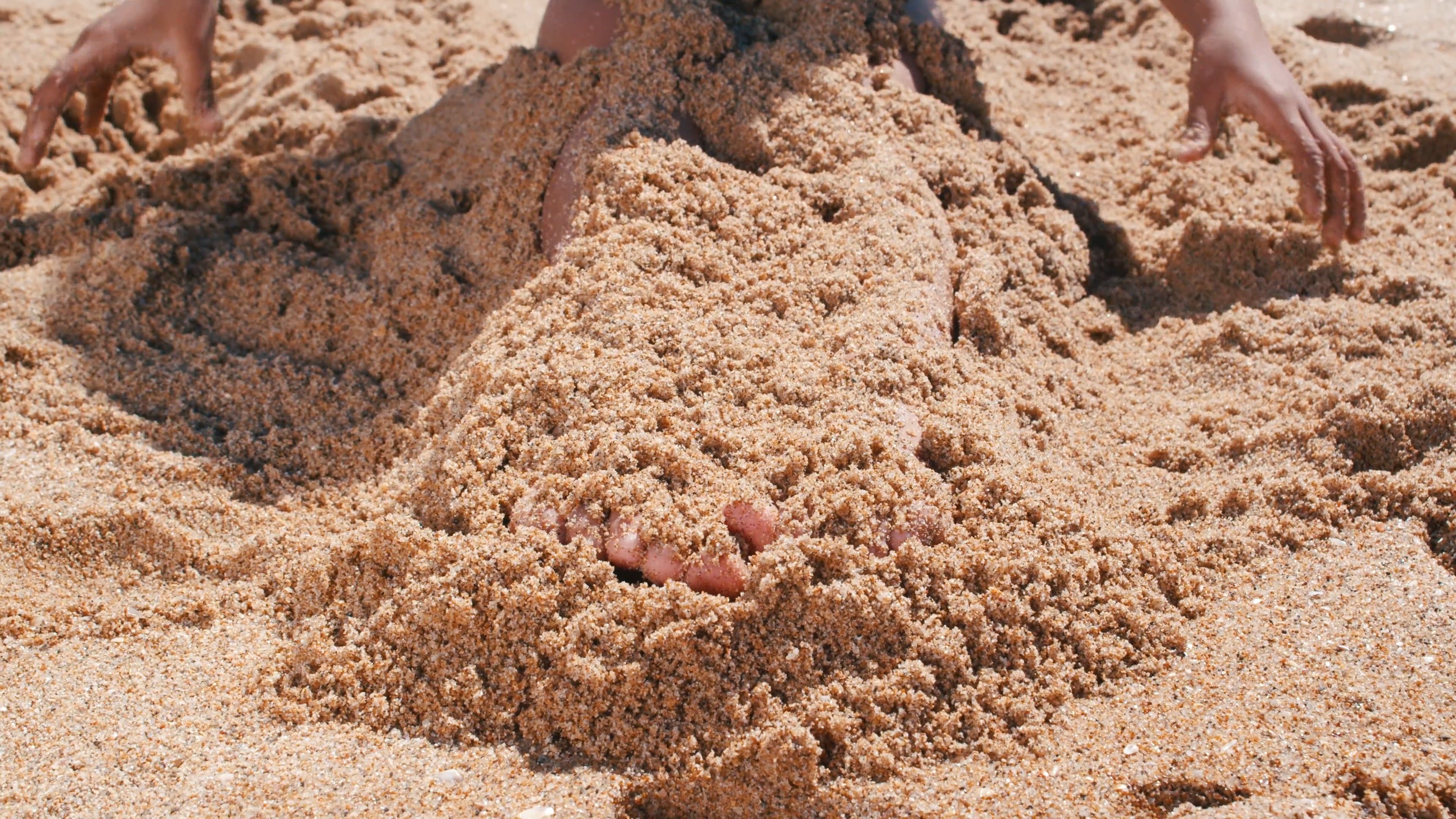 Girl Covering Her Legs With Sand Free Stock Video Footage, Royalty-Free ...