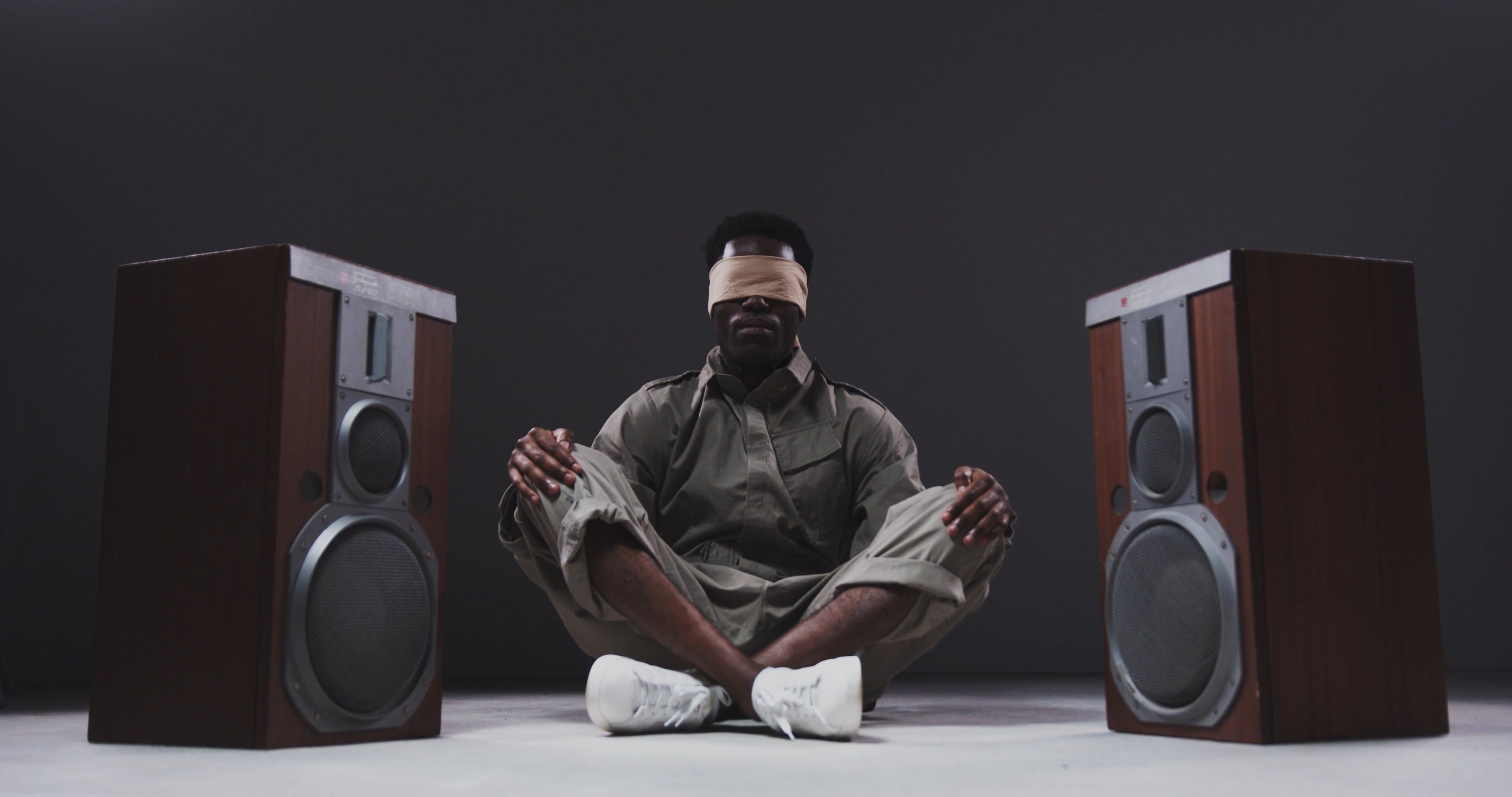 Man With Eyes Covered Among Stereo Speakers Free Stock Video Footage ...