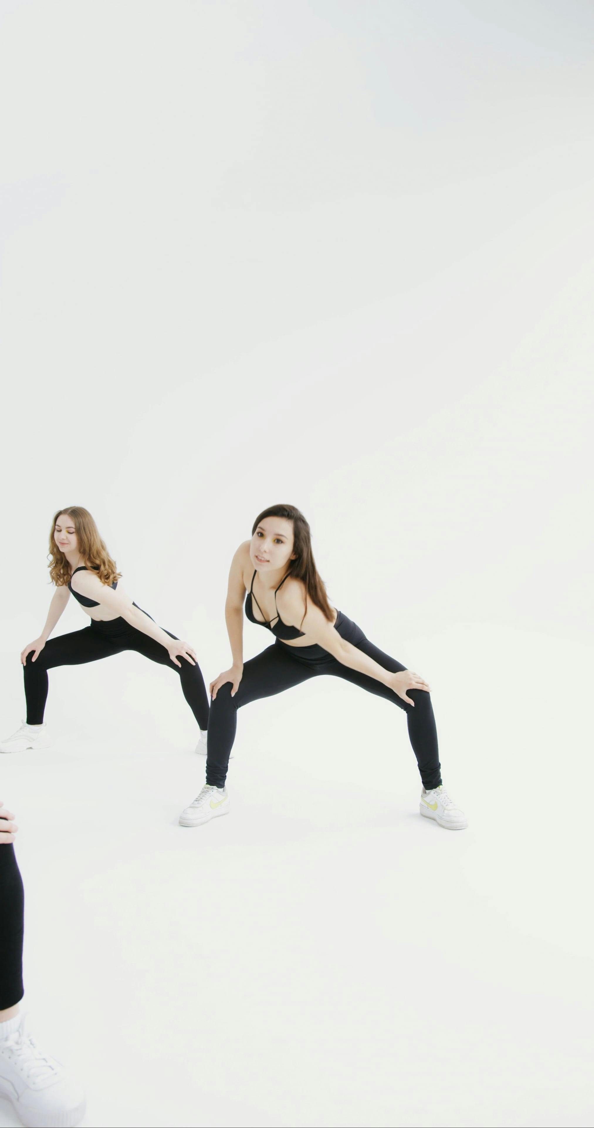 Cheerleaders Stretching Together · Free Stock Video