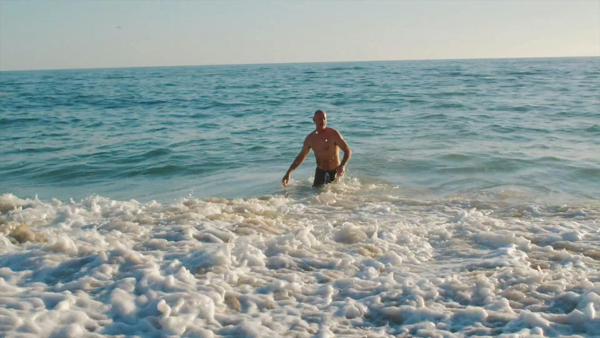 Man Getting Out of the Water · Free Stock Video