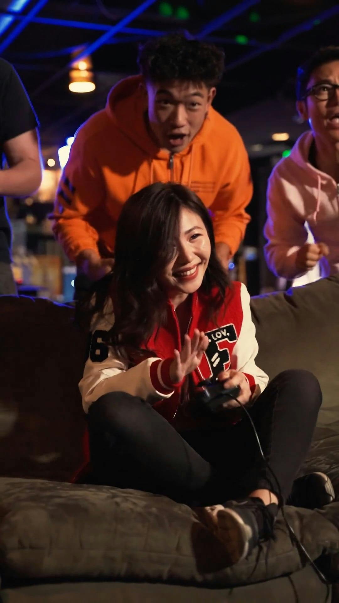 Boys Cheering For The Female Gamer · Free Stock Video