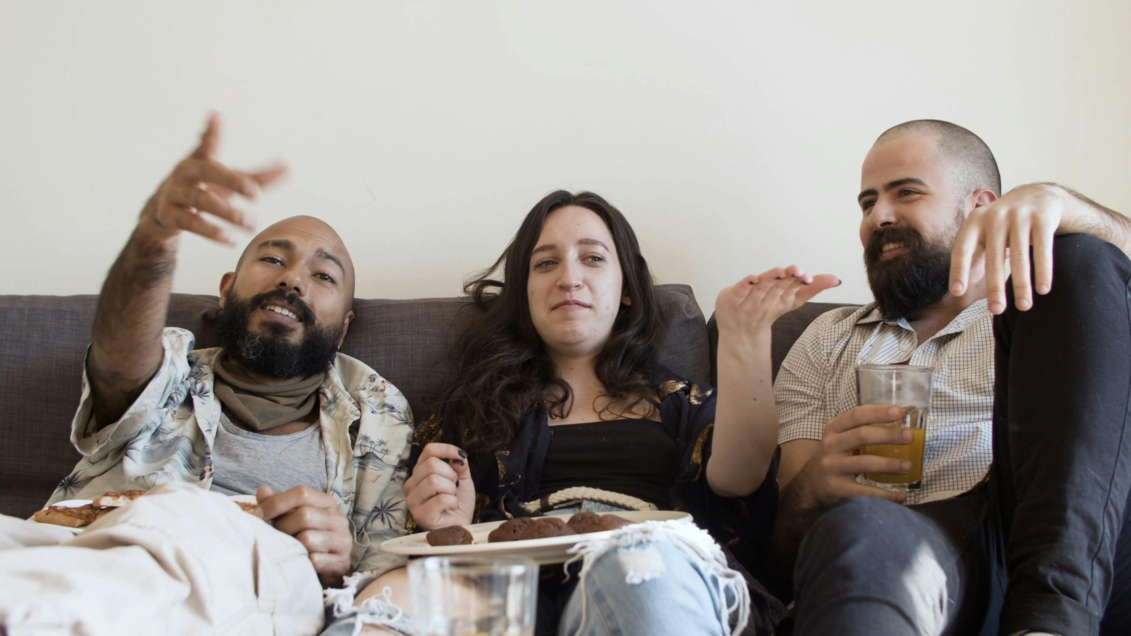 People Sitting and Laughing Together on a Sofa Free Stock Video Footage ...