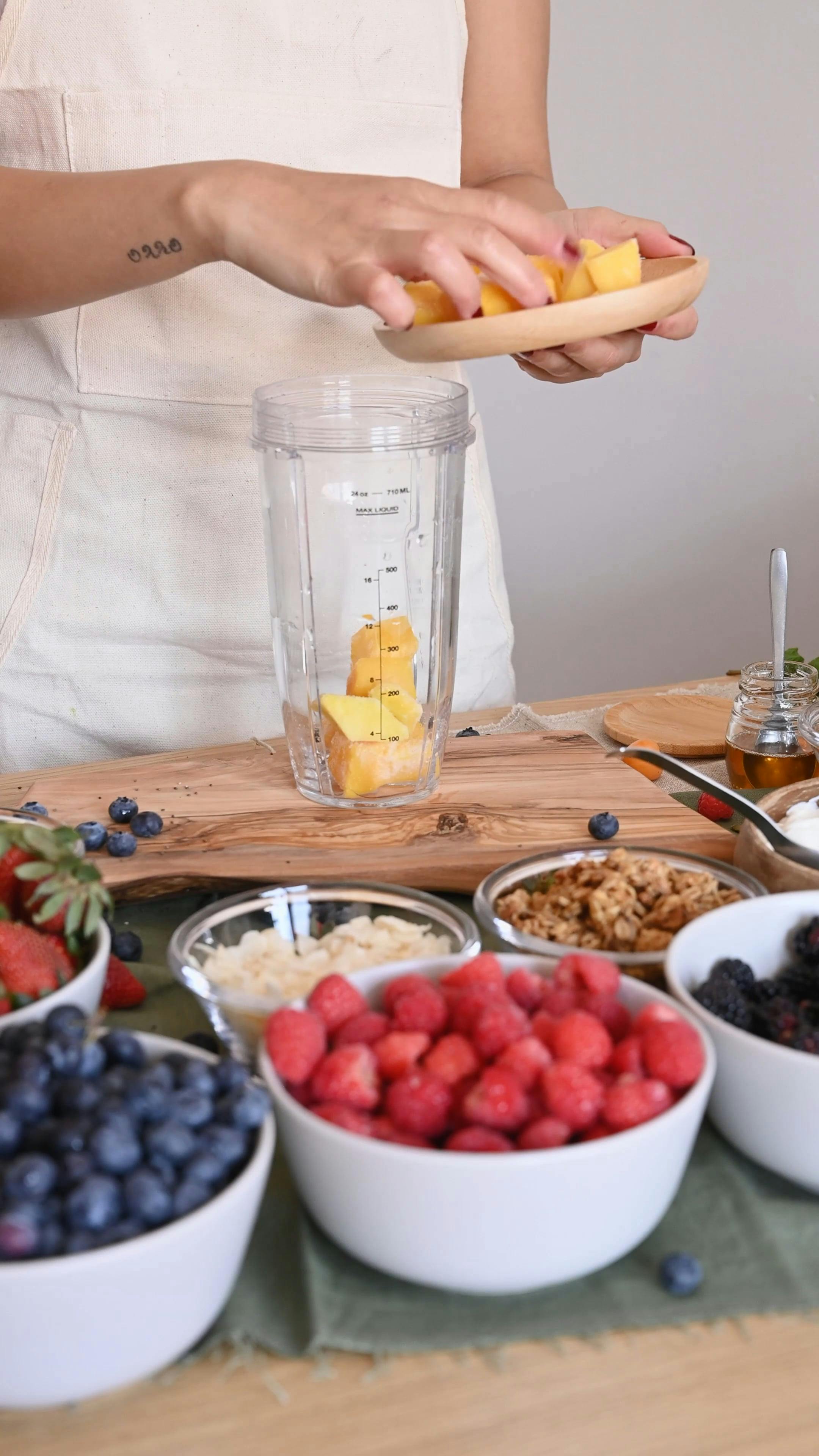 A Person Making a Shake · Free Stock Video