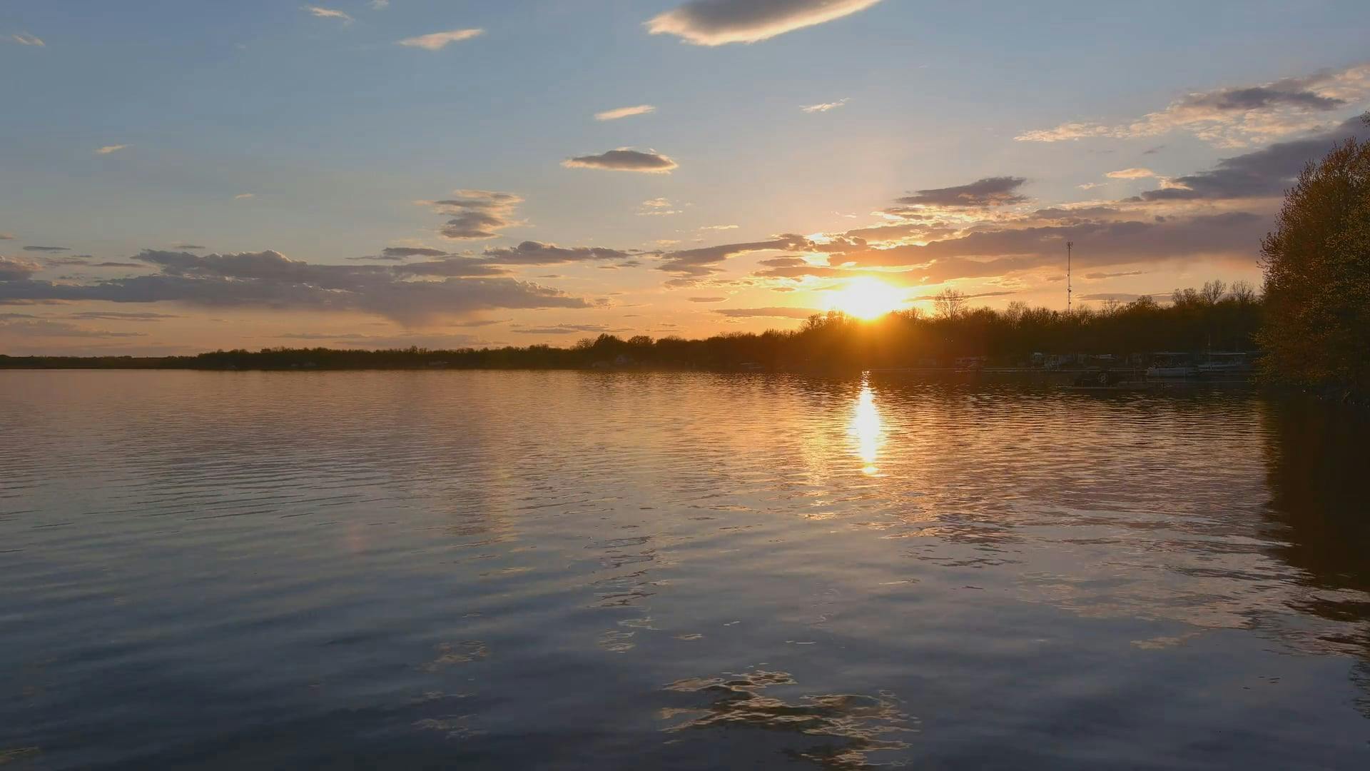 A Picturesque Sunset at a Lake · Free Stock Video