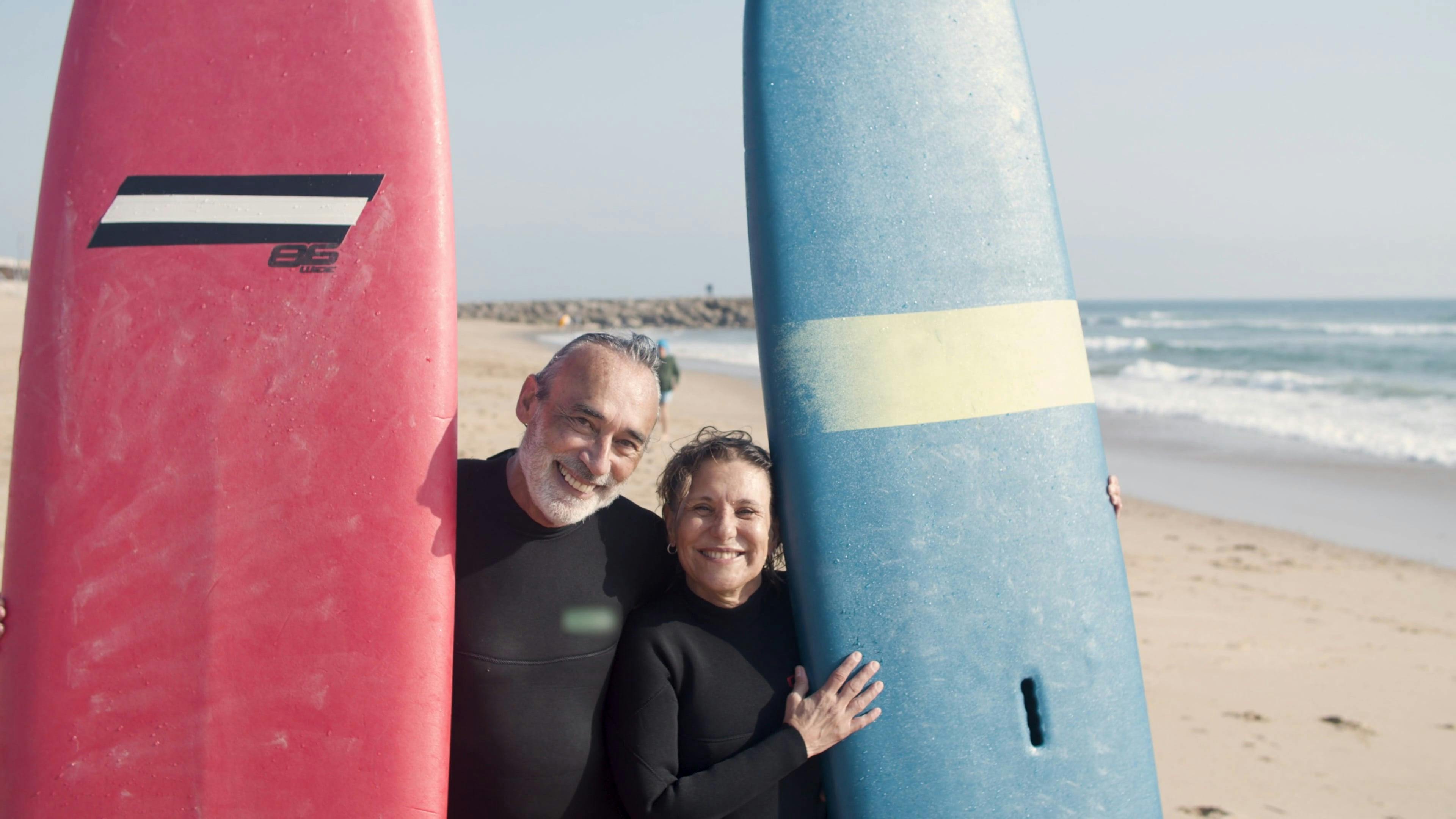 Couple Holding Surf Board · Free Stock Video