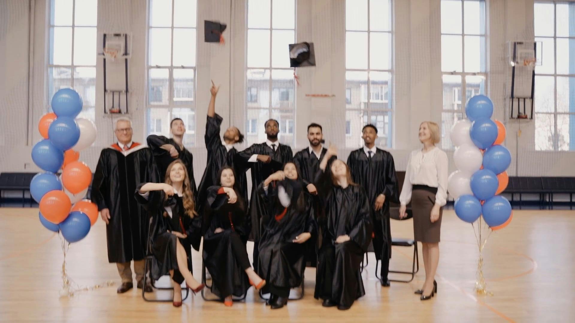A Woman Throwing Her Graduation Cap and Spinning in Happiness · Free ...