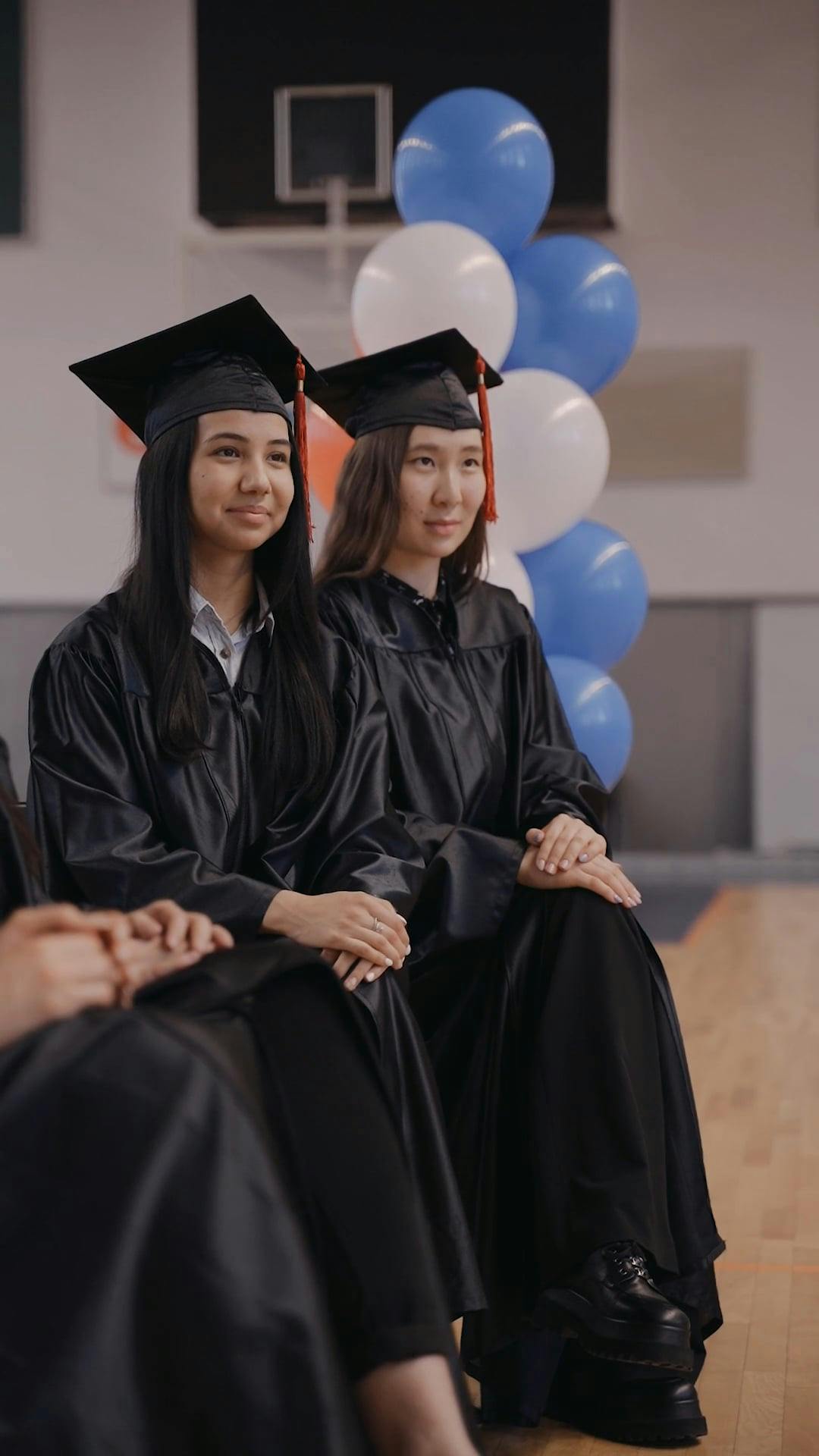 Video of Graduating Students Sitting Together · Free Stock Video
